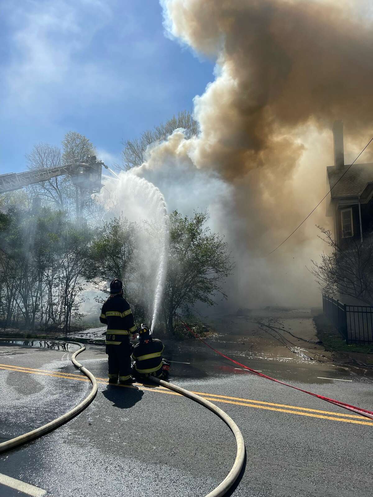 Hartford officials: fire kills dog, displaces families