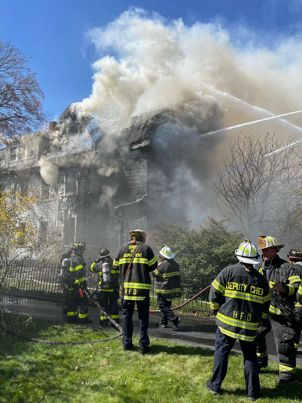 Hartford officials: fire kills dog, displaces families