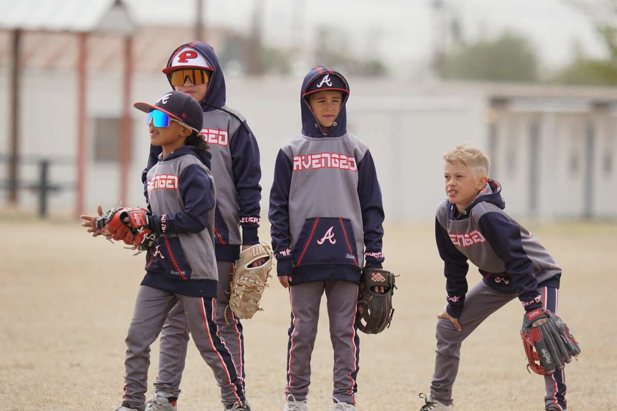 Brian Klein spends time with Plainview Avenged 9u players