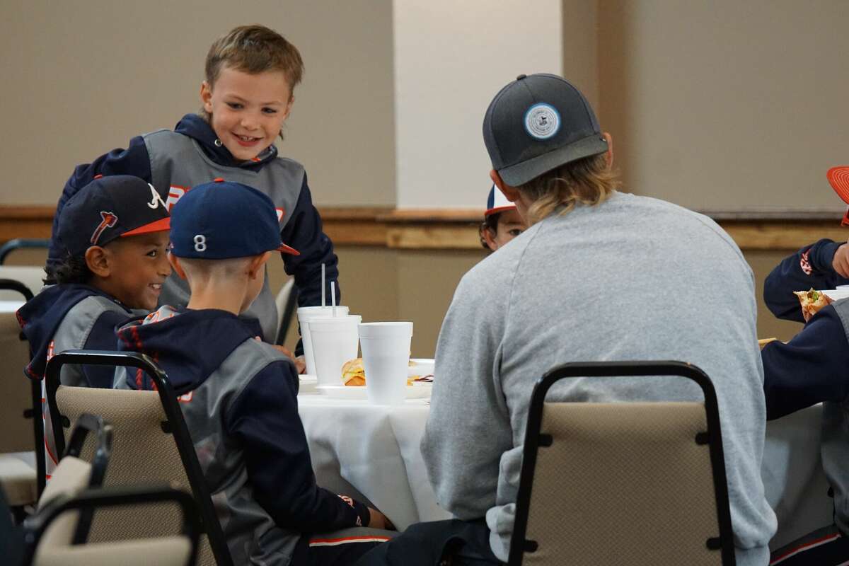 Brian Klein spends time with Plainview Avenged 9u players