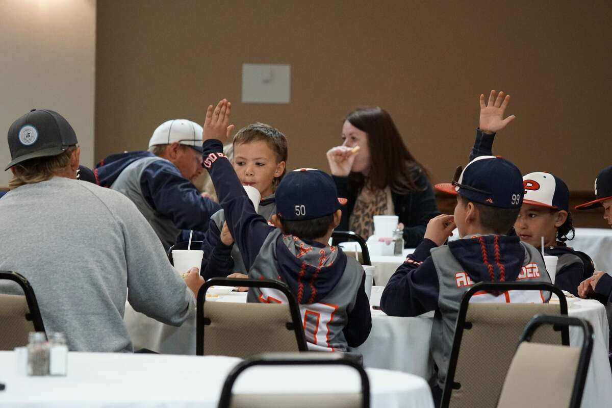 Brian Klein spends time with Plainview Avenged 9u players