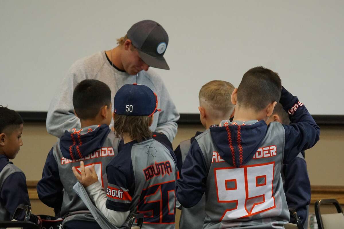 Brian Klein spends time with Plainview Avenged 9u players