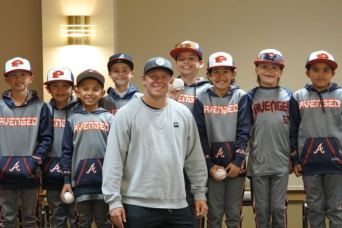 Brian Klein spends time with Plainview Avenged 9u players