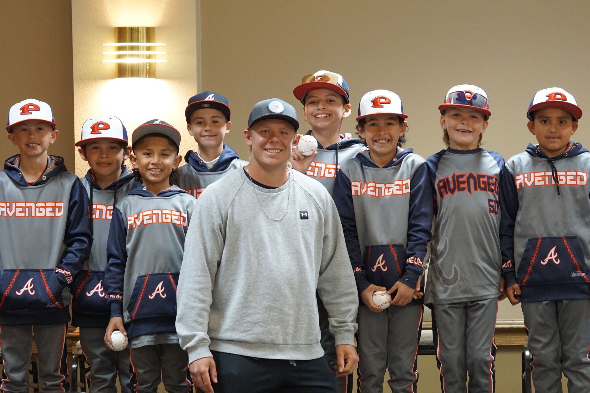 Brian Klein spends time with Plainview Avenged 9u players