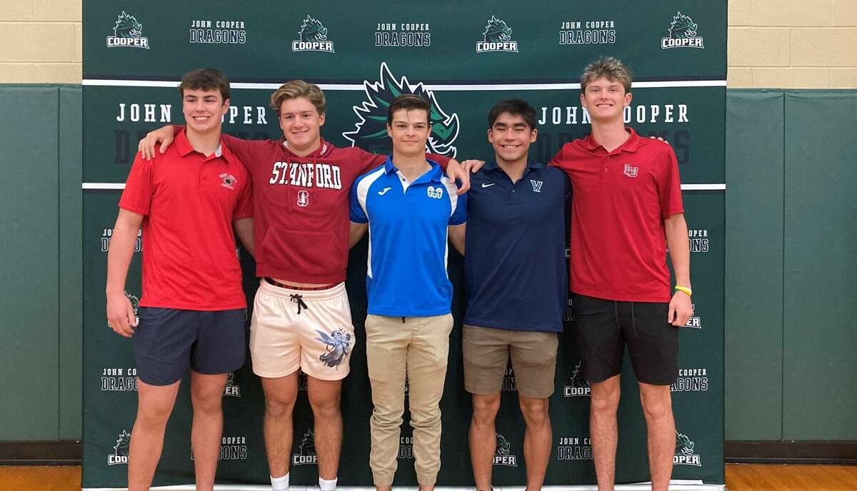 John Cooper celebrates five athletic signees