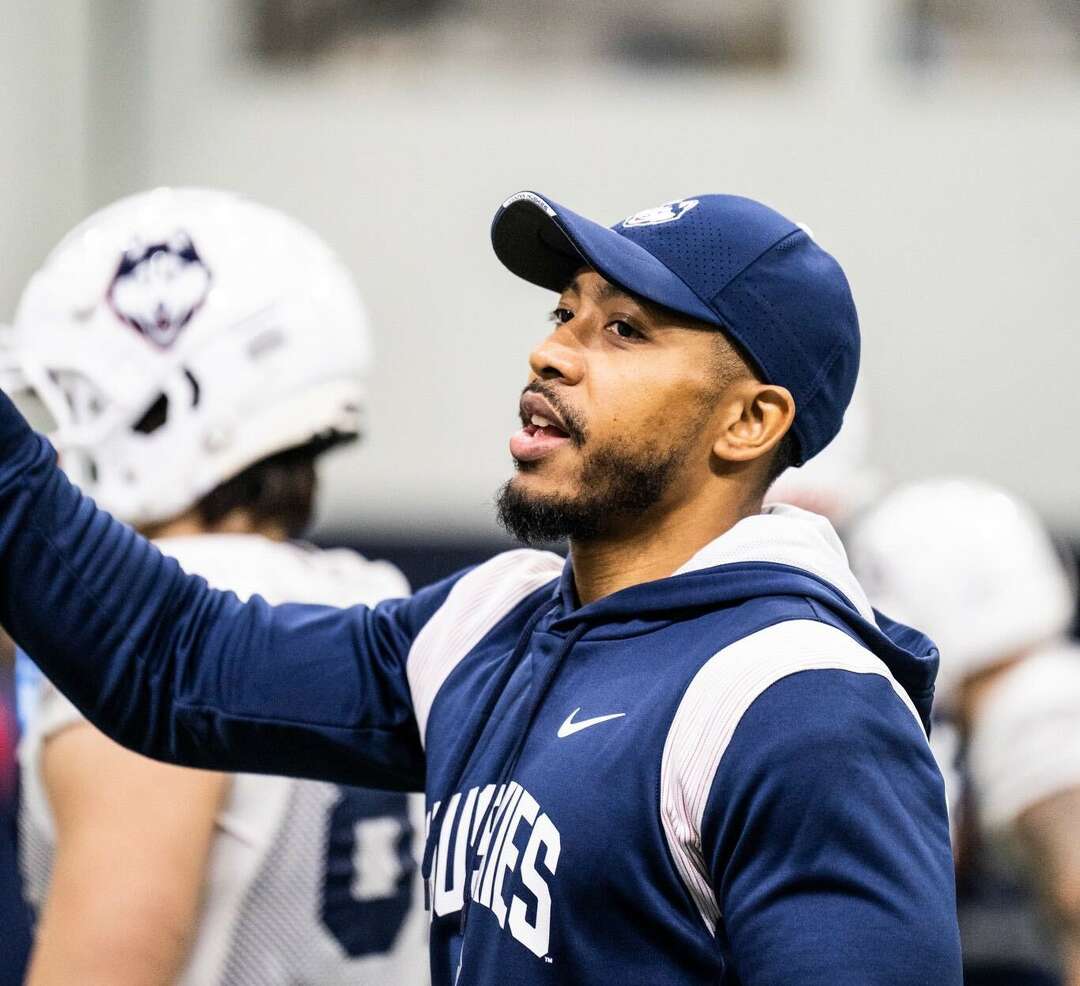 UConn football receiver coach Kashif Moore back with alma mater