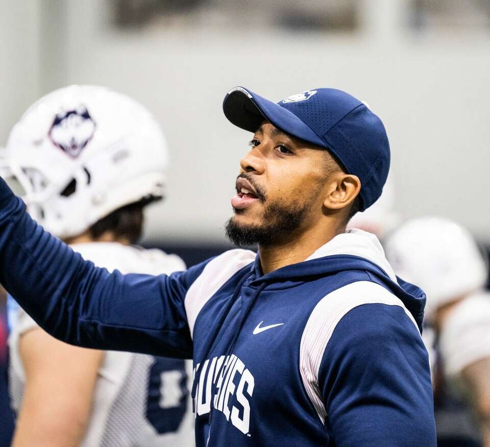 UConn football receiver coach Kashif Moore back with alma mater