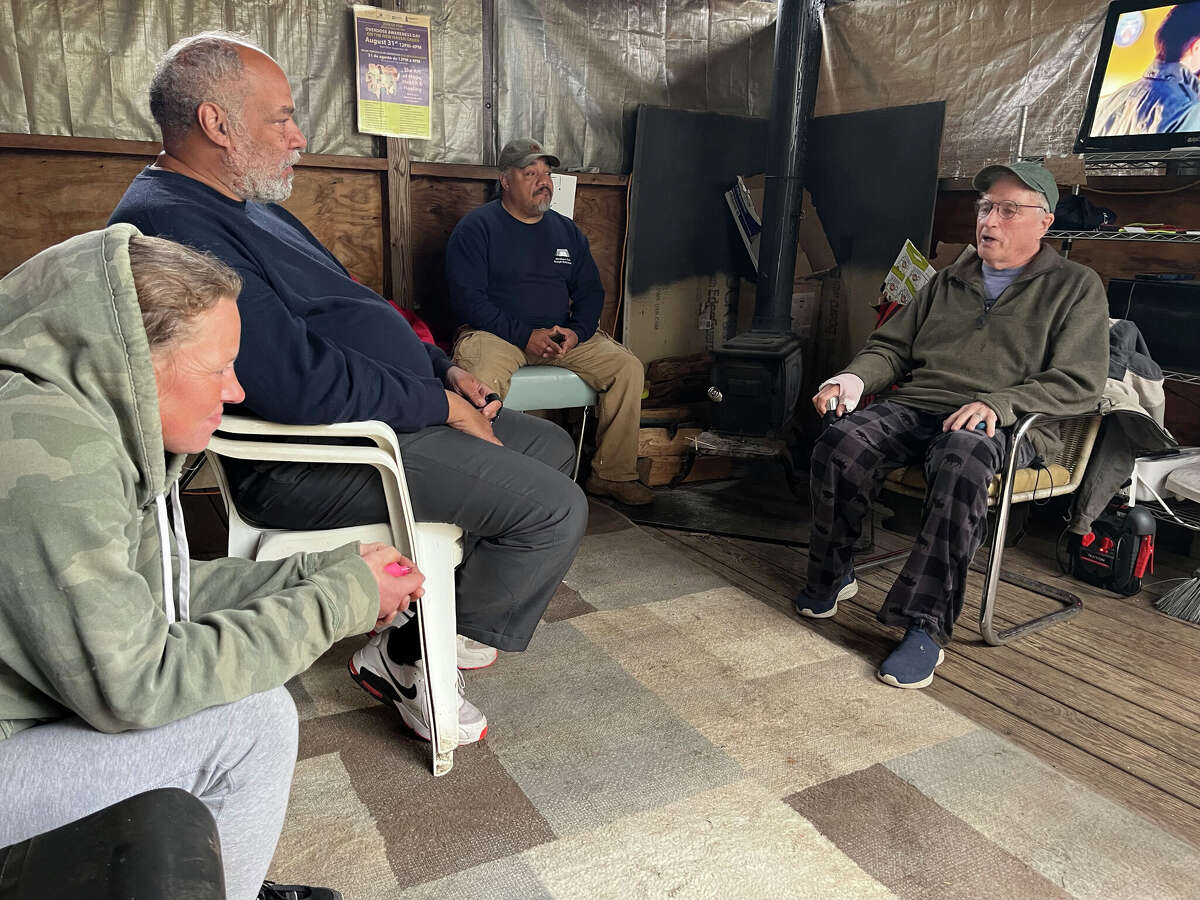 On New Haven's Rosette Street, backyard encampment grows