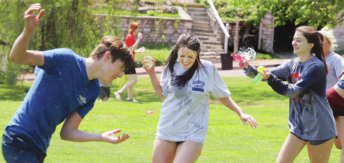 Marquette students wage water balloon war Friday in Alton