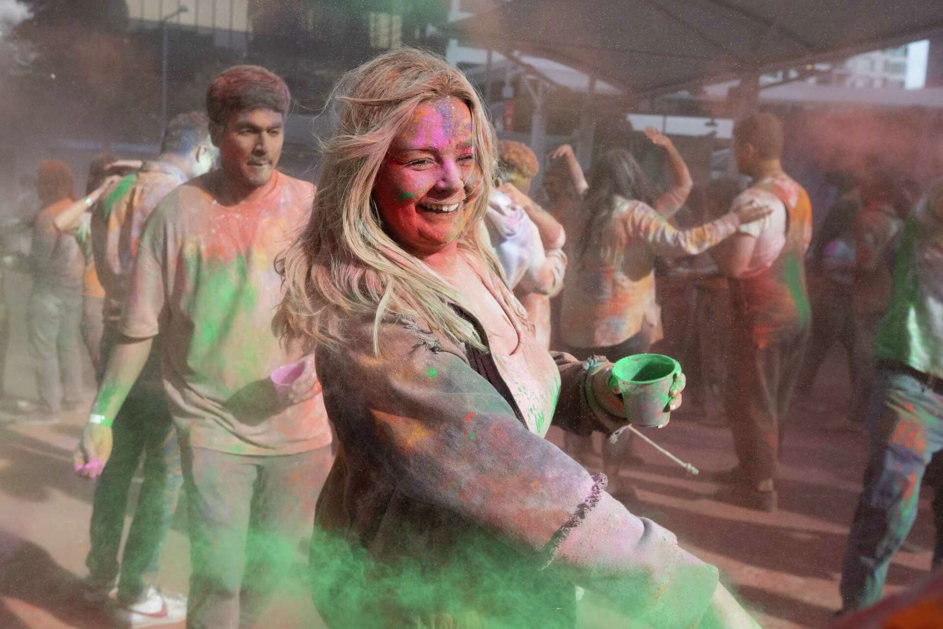 San Francisco neighborhood turns out for colorful Holi festival