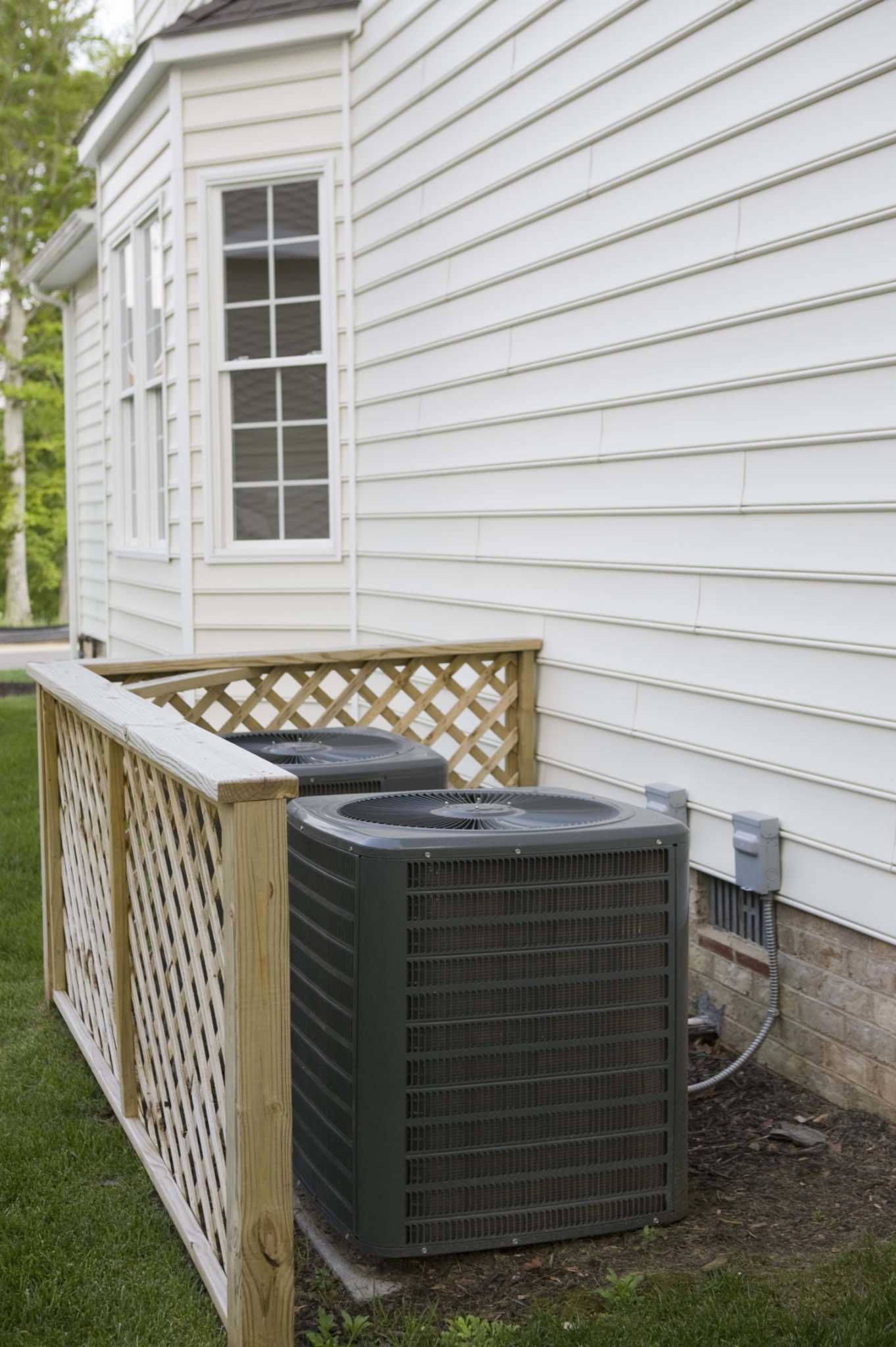 How to Install Anti-Vibration Pads Under an Air Conditioner