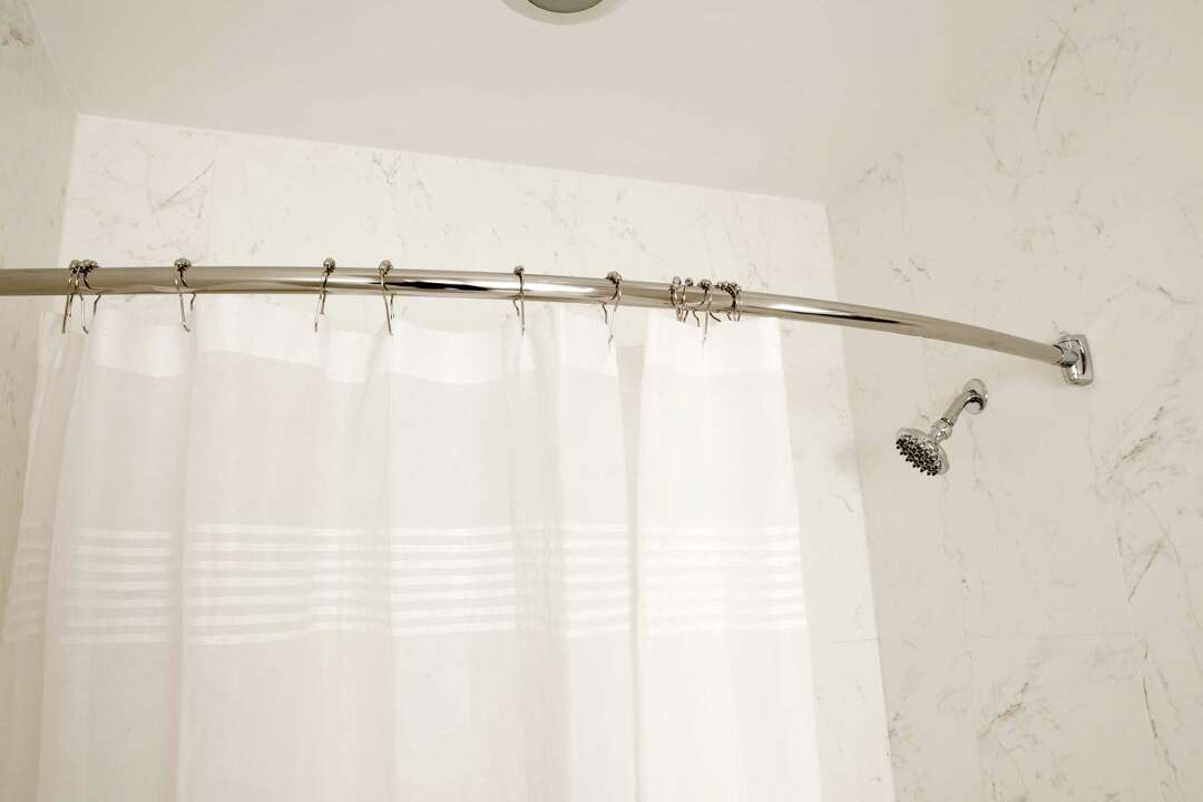 How to Install a Curved Shower Rod in a Shower Stall