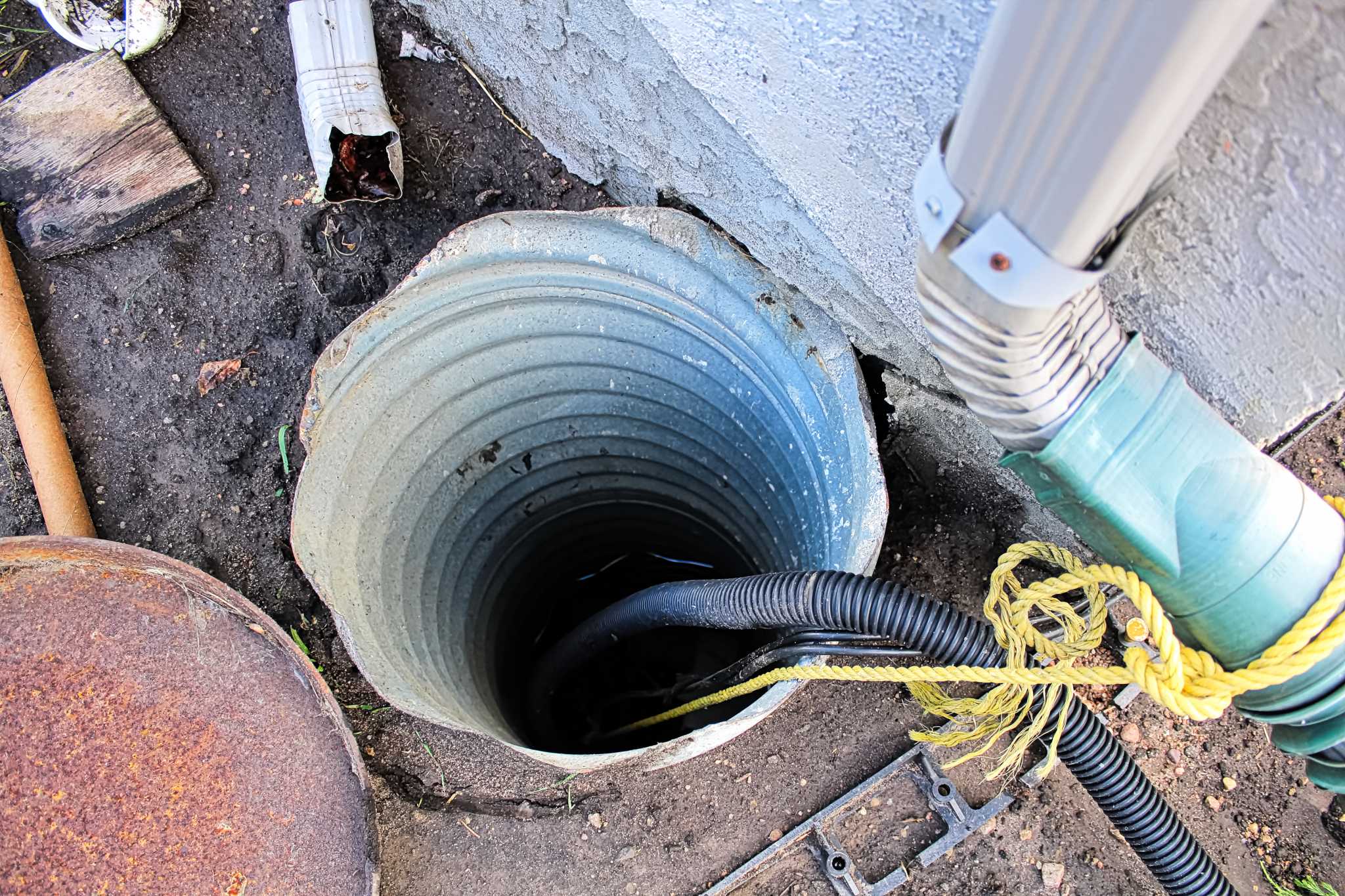 How to Clean a Sump Pump Drain Pipe