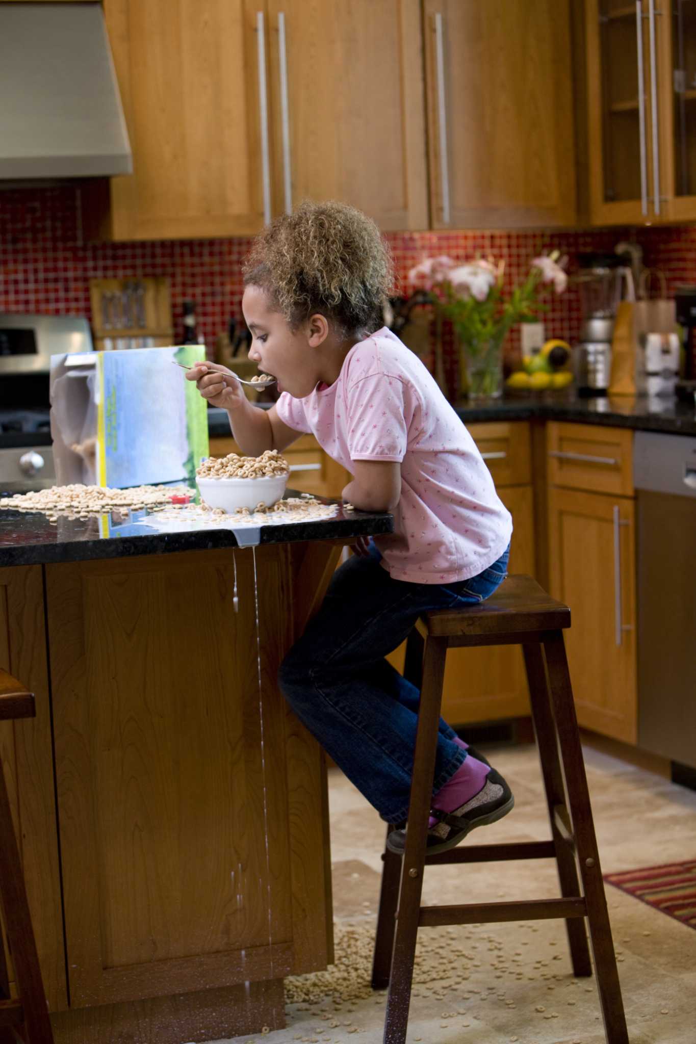 How to Clean Wood Cabinets That Have Food Stuck to Them