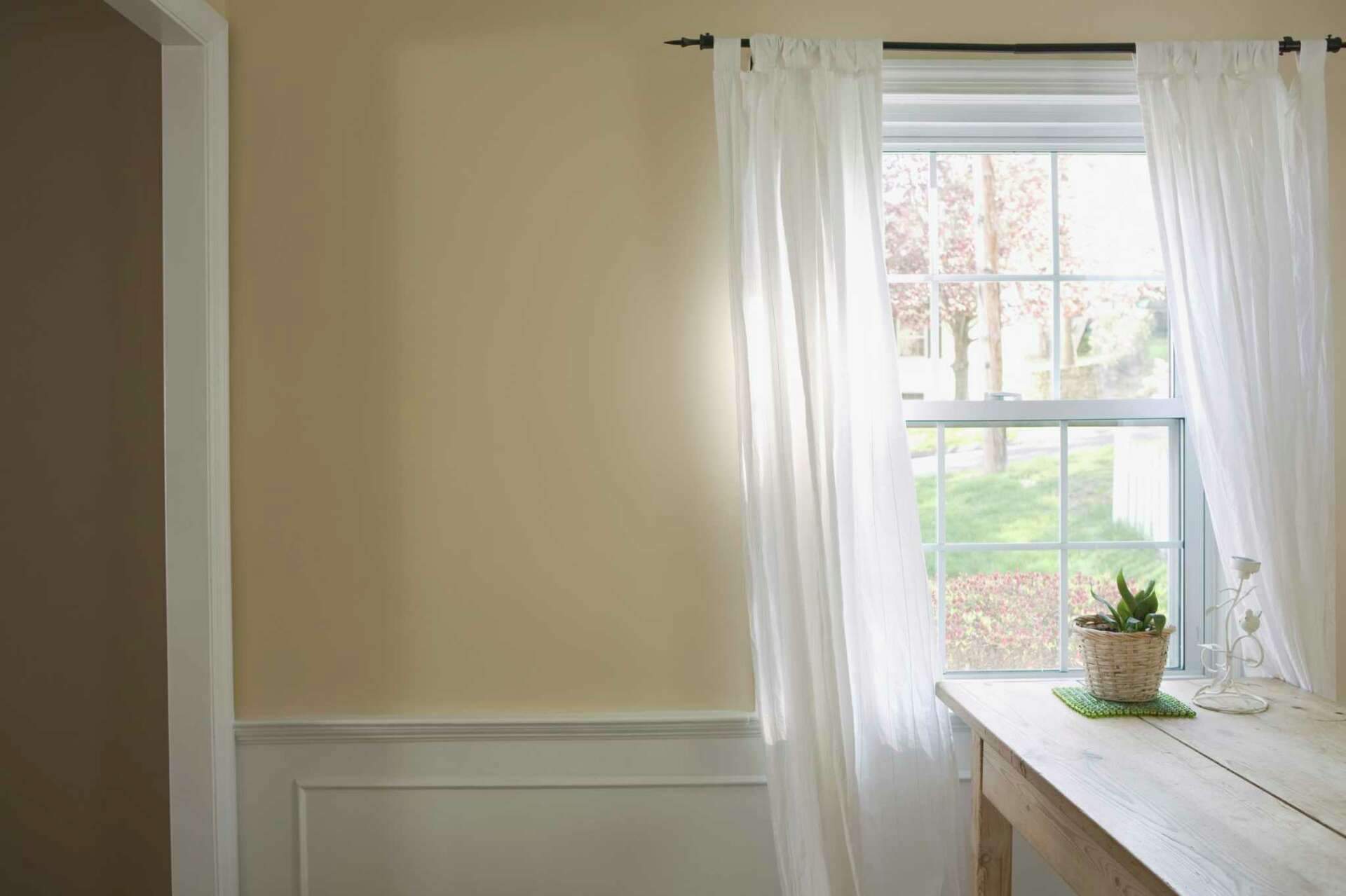 How to Install Wainscoting Over Tile