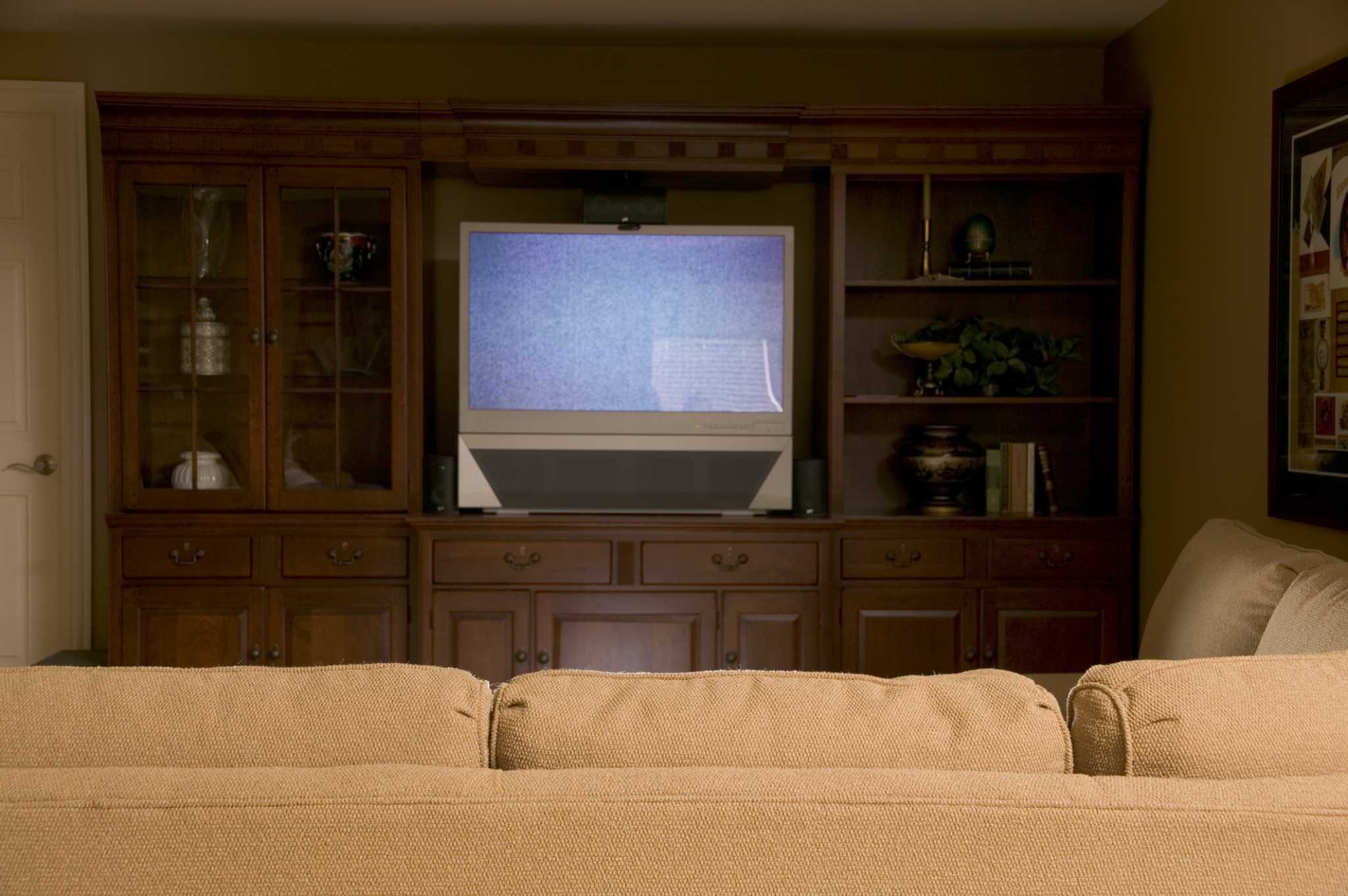 How to Convert an Entertainment Center Into a Bar