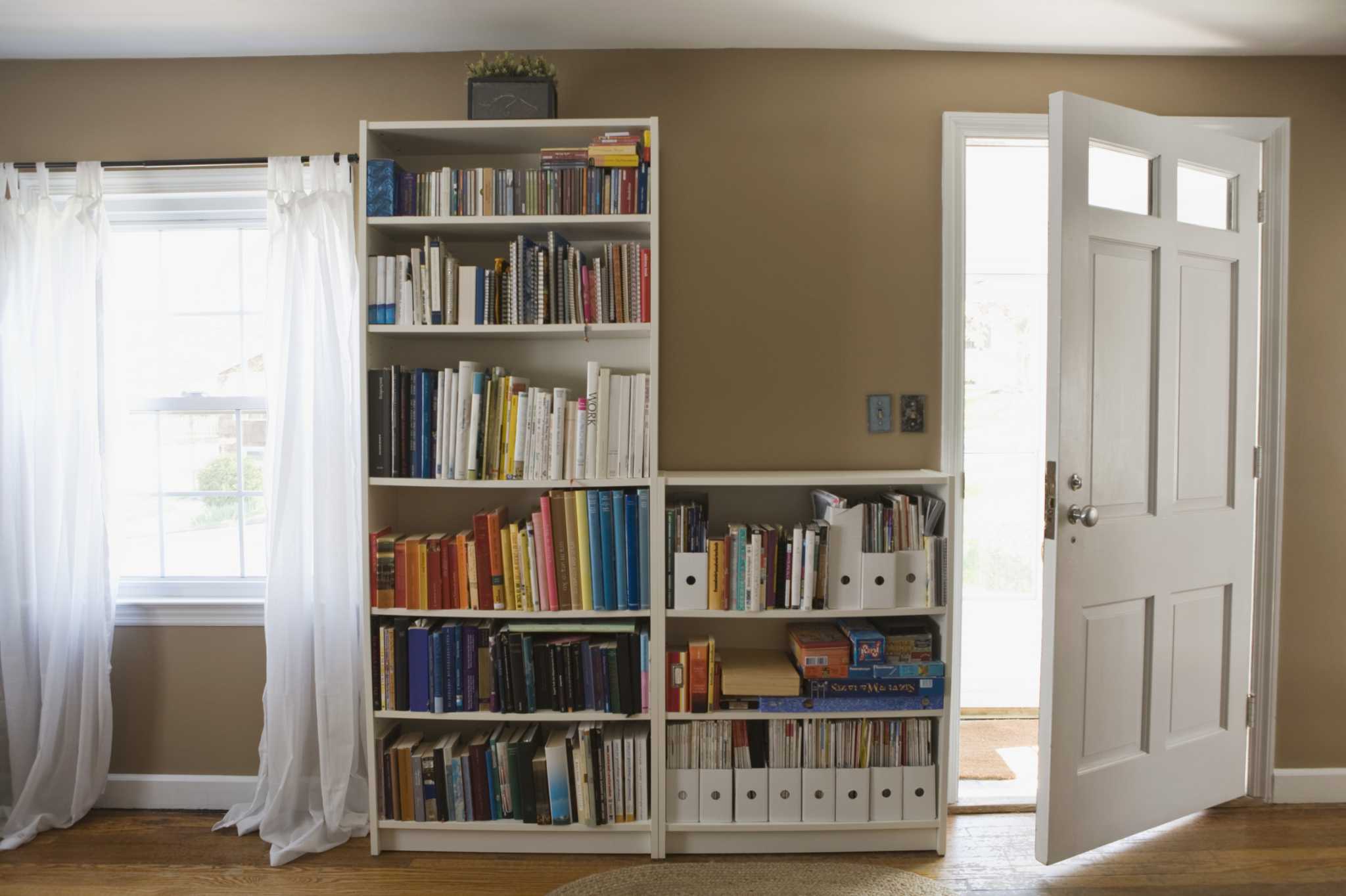 How to Cover a Bookcase With Curtains