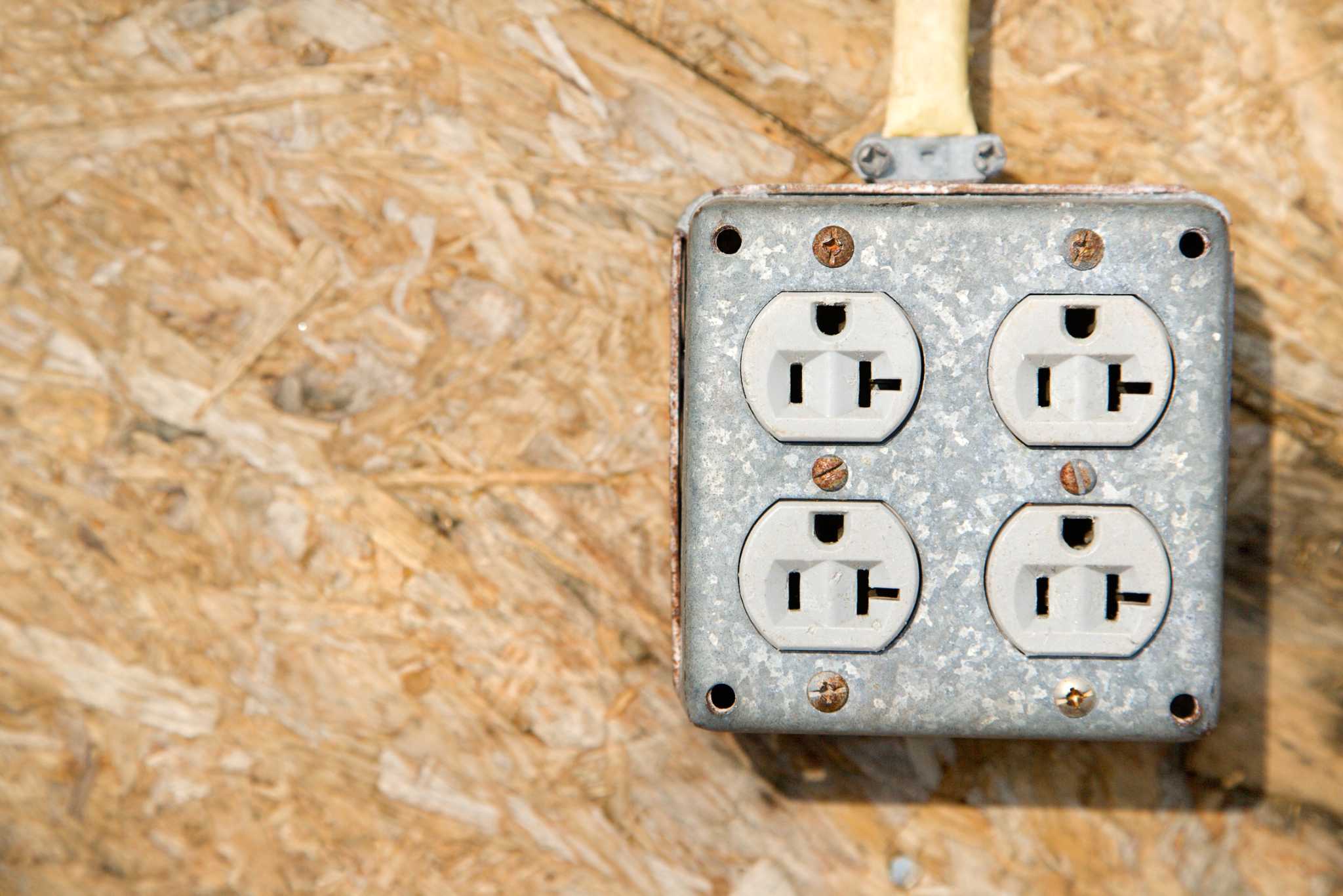 How to Cut Holes in Floor Joists for Romex