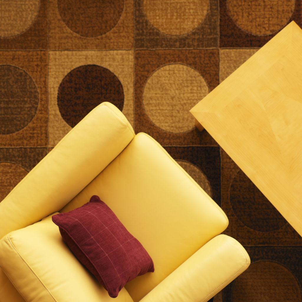 How To Place A Large Area Rug Over A Worn Wall to Wall Carpet