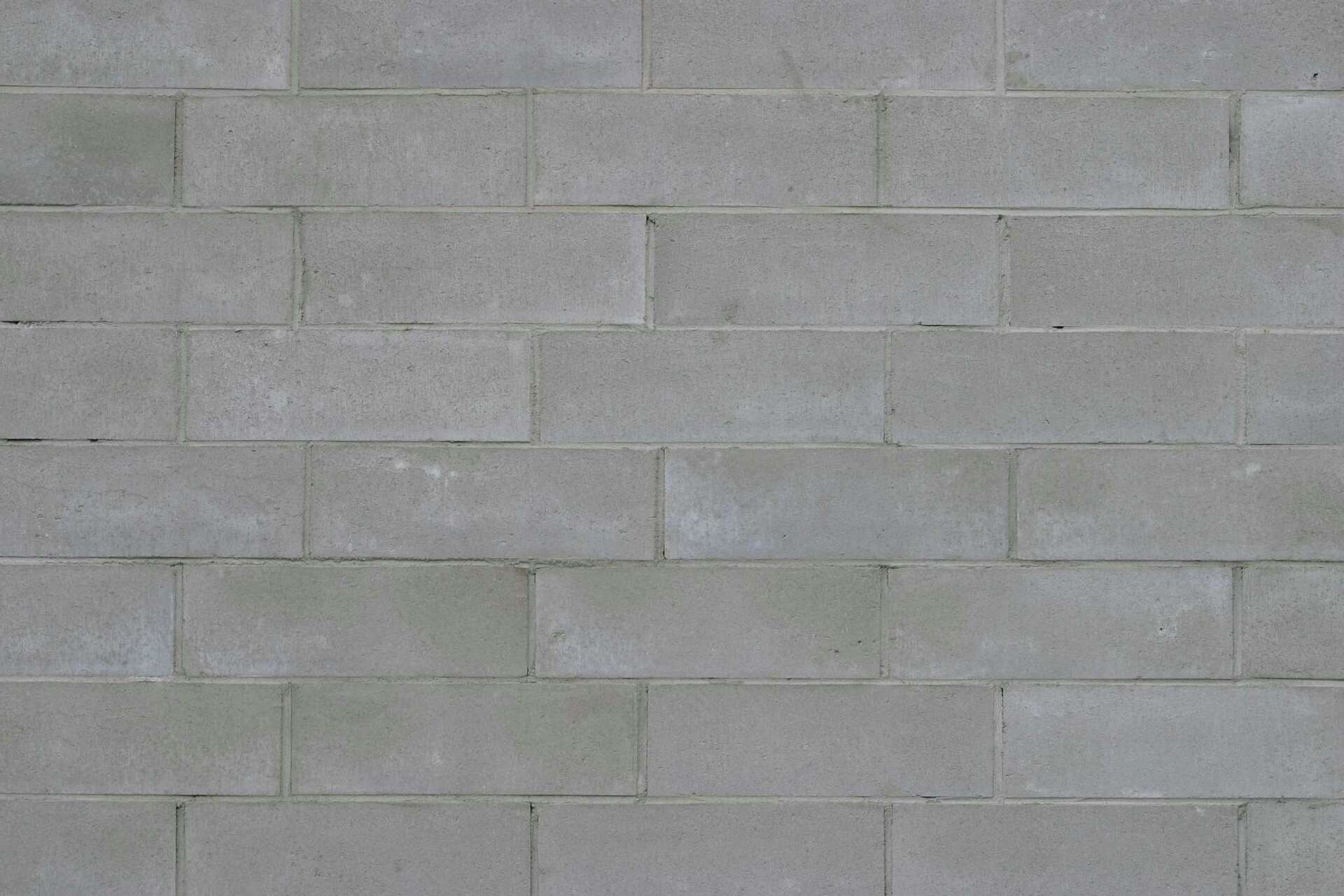 How to Glue a Vapor Barrier to a Cement Block Wall