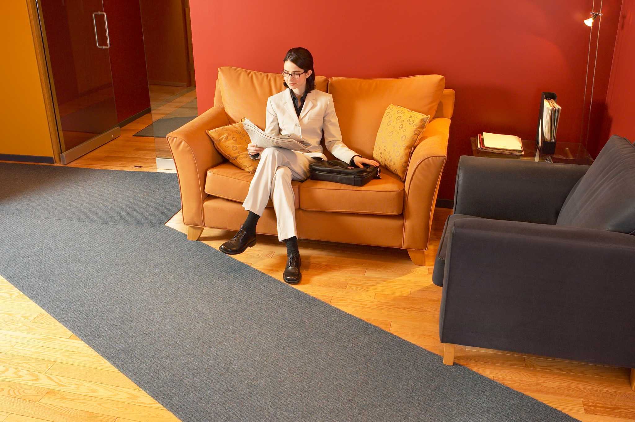 How to Decorate Your Home With an Orange Sofa