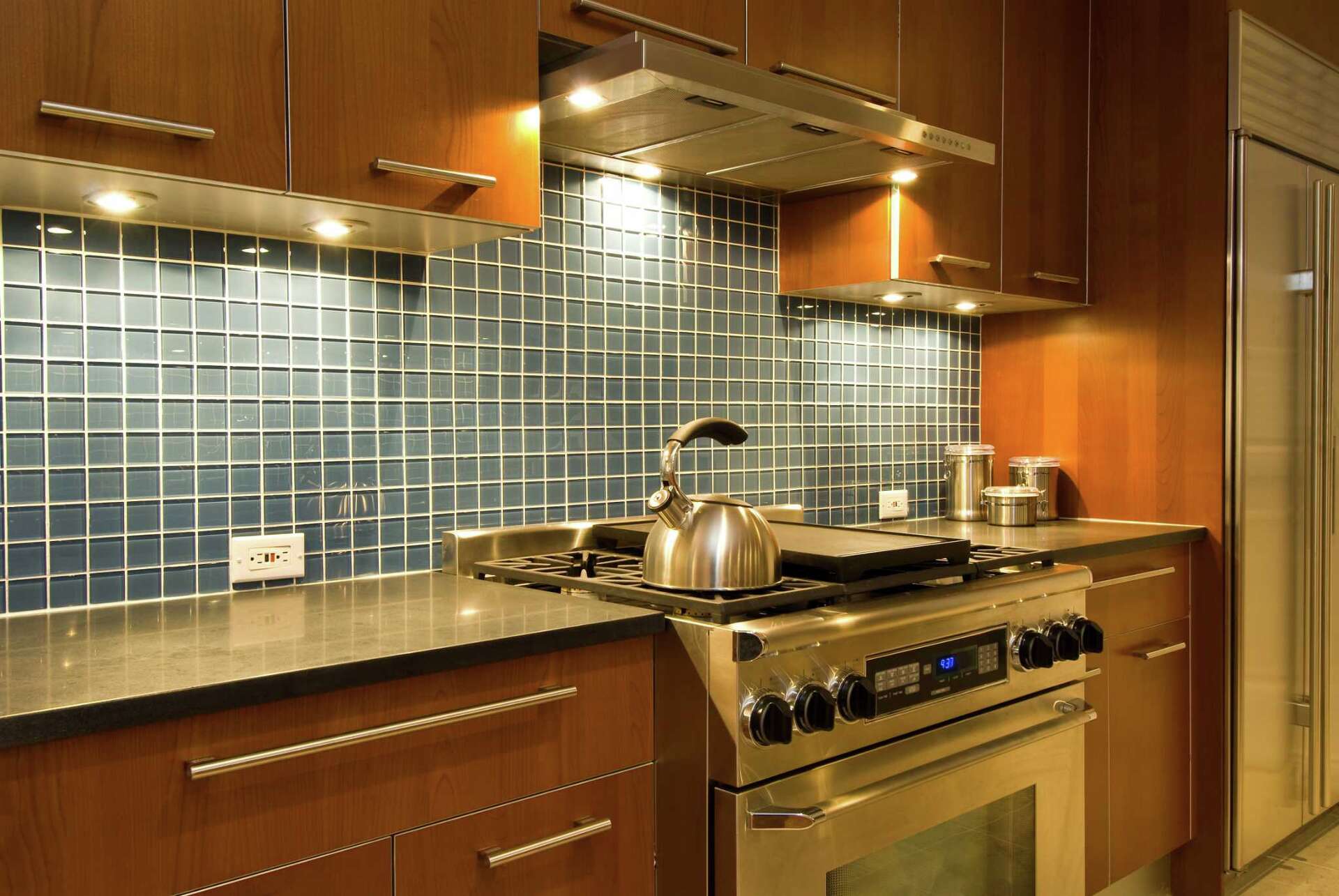 How to Put Tile Over a Formica Backsplash