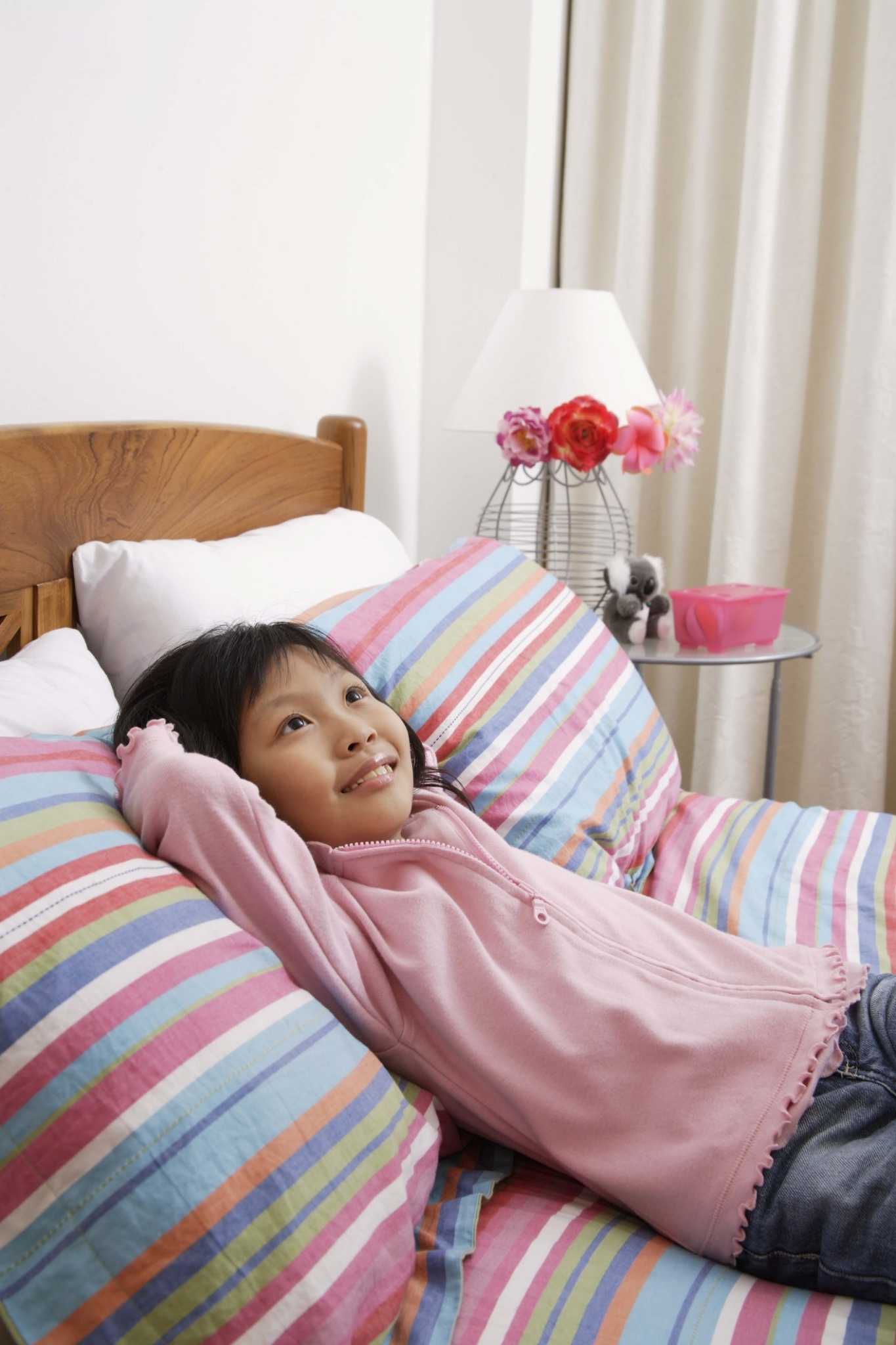 How to Decorate a Little Girl's Room With a Queen Bed