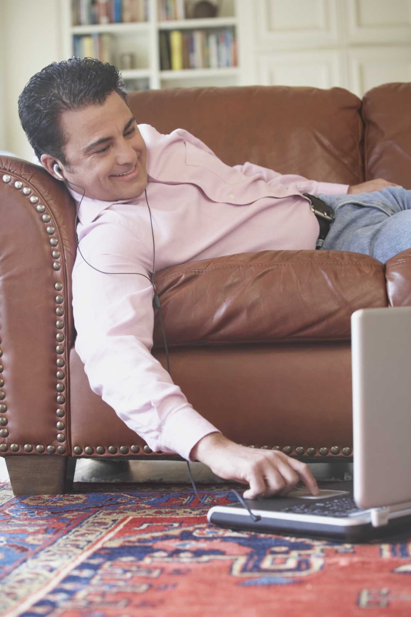 How to Decorate a Living Room With a Leather Couch With Brass Rivets