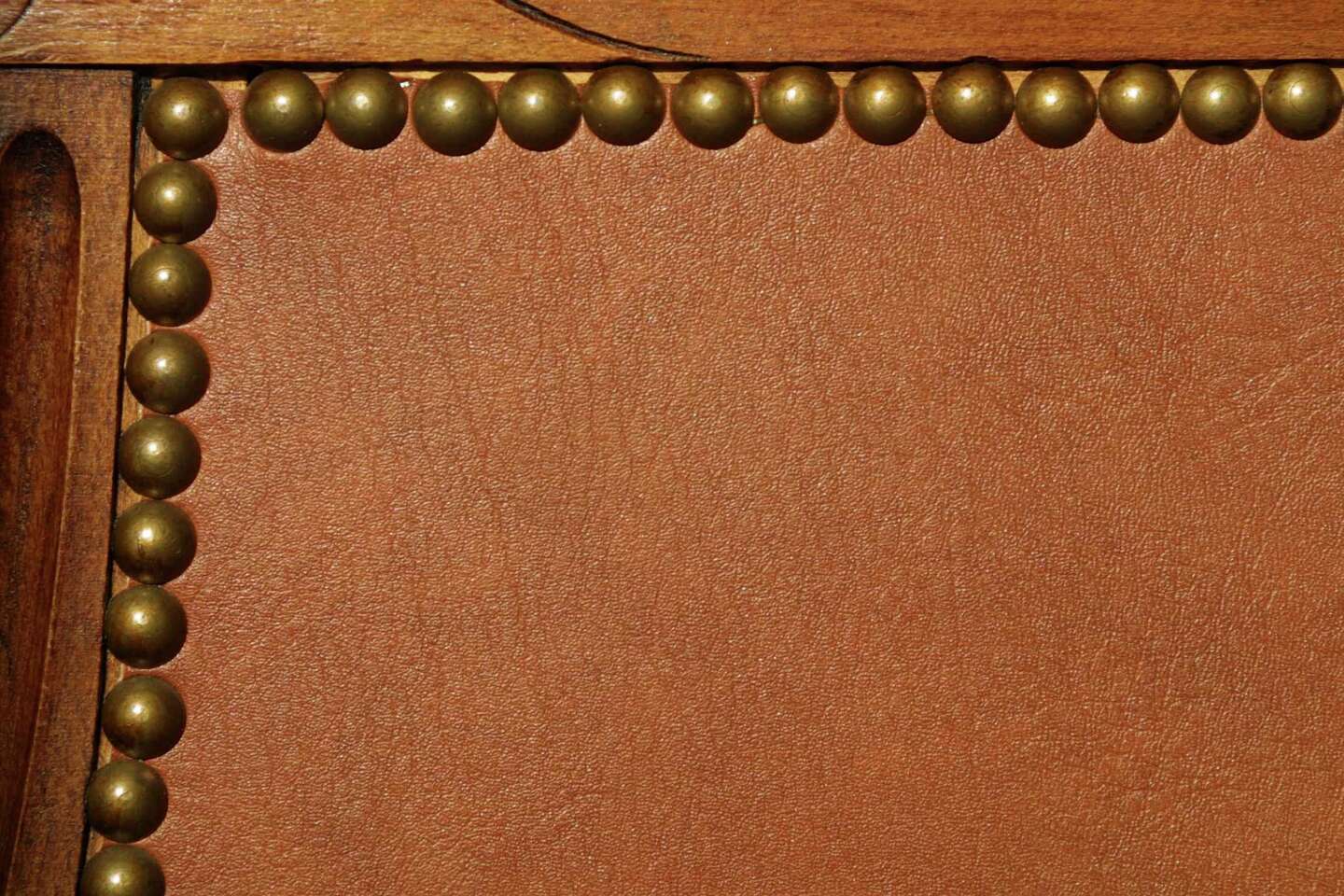 How to Remove Upholstery Tacks on Leather Dining Chairs