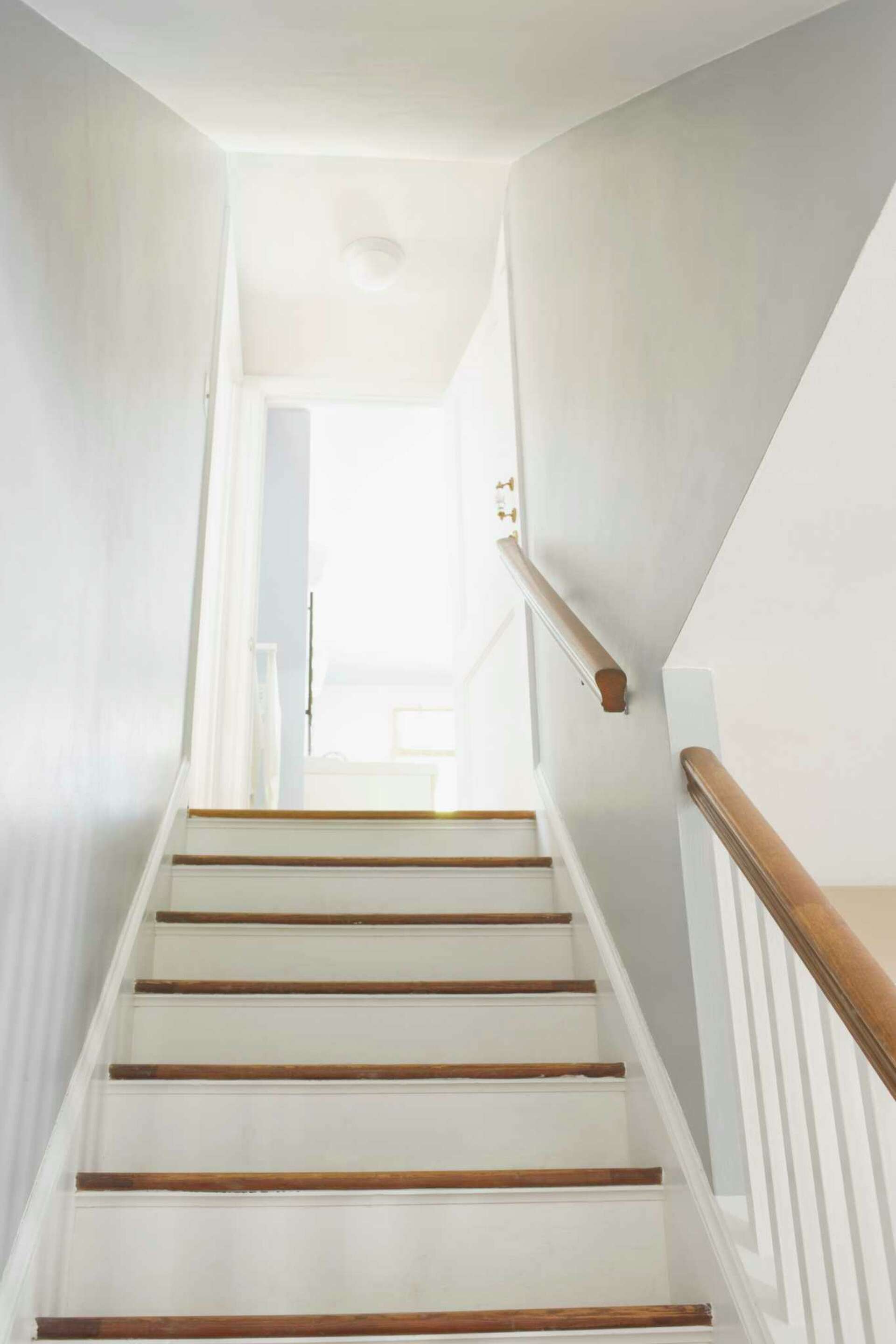 How to Anchor Stair Railing With Plaster & Lath