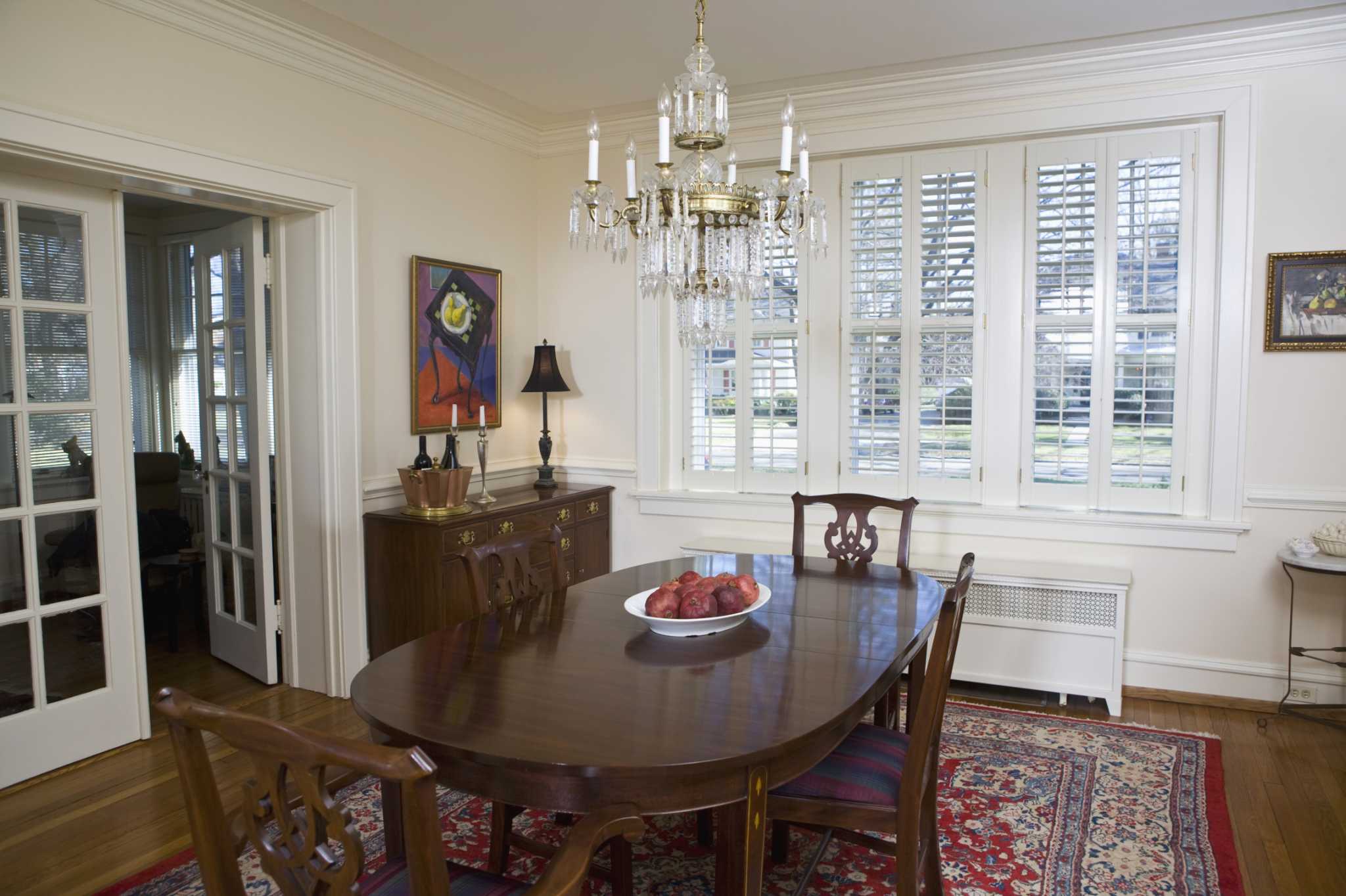 How to Decorate the Wall Above a Dining Room Side Table