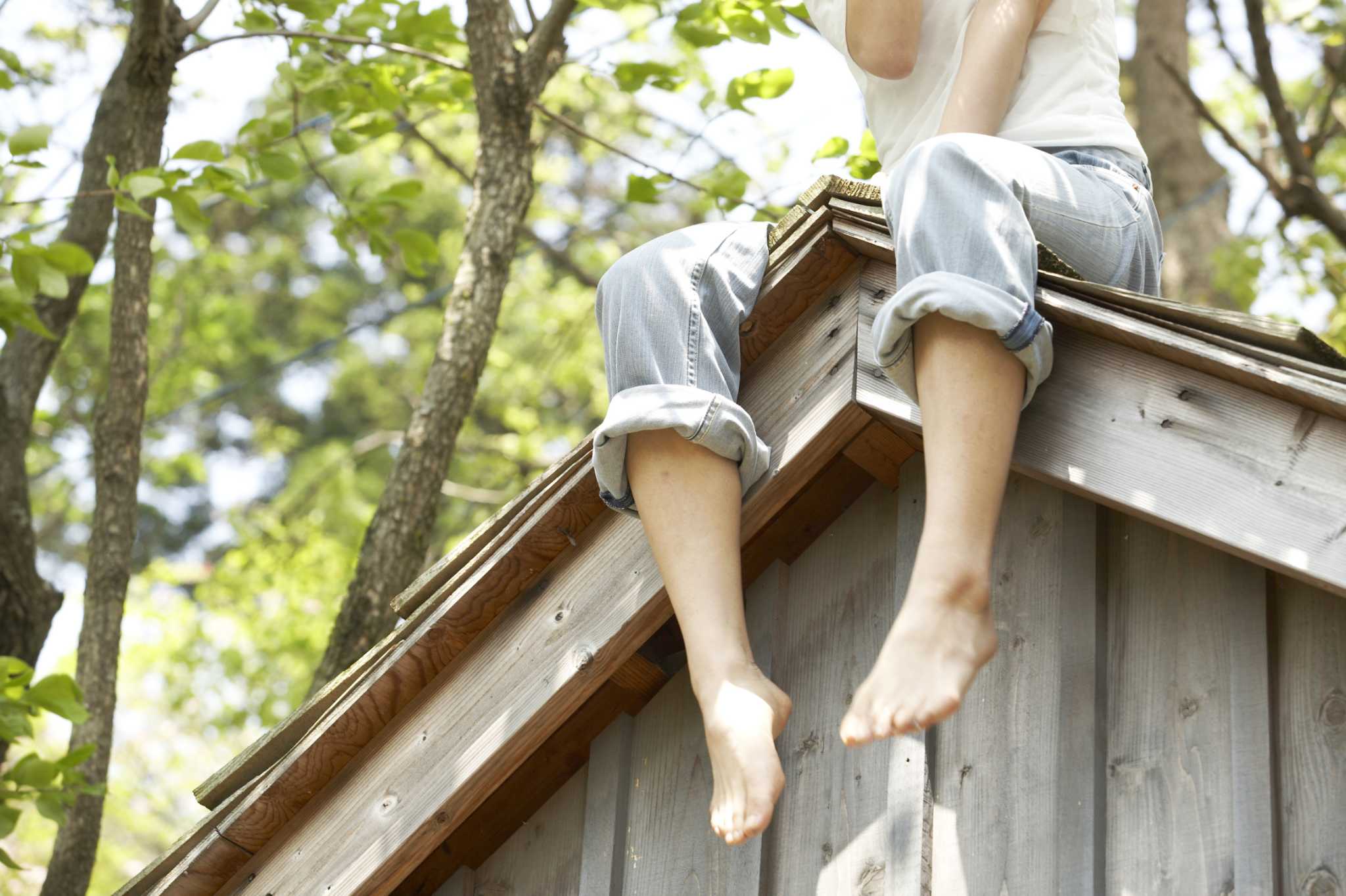 How to Finish Off Ridge Caps on a Peaked Cedar Roof