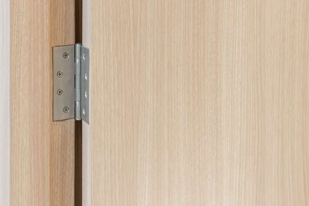 How to Determine Hinge Spacing on a Door