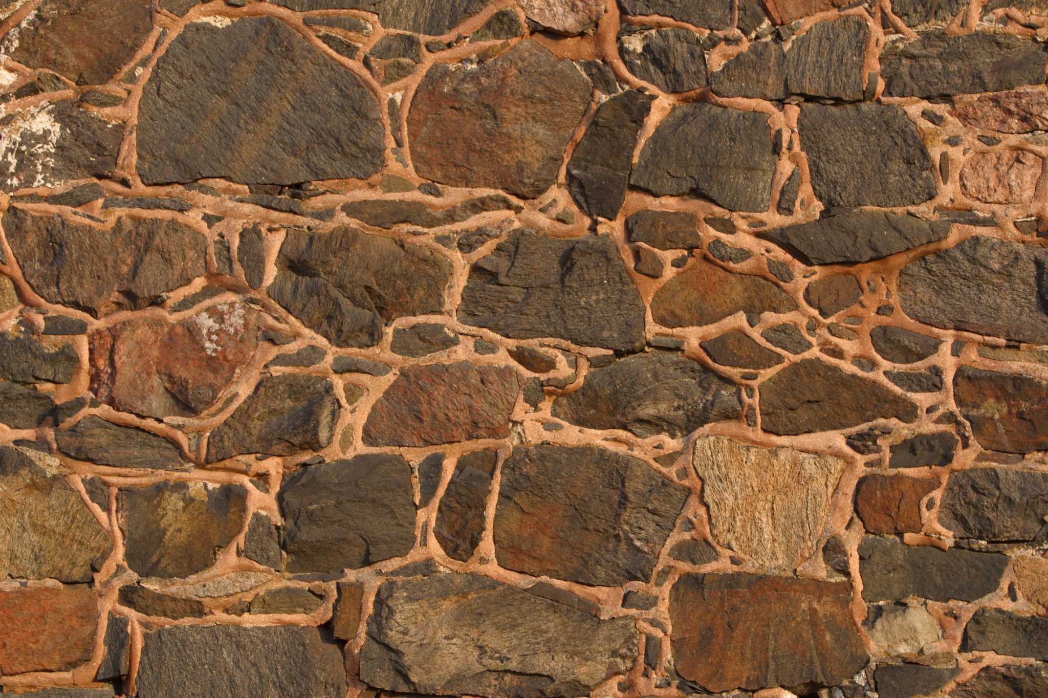 How to Add Stone Veneer to a Concrete Foundation Wall