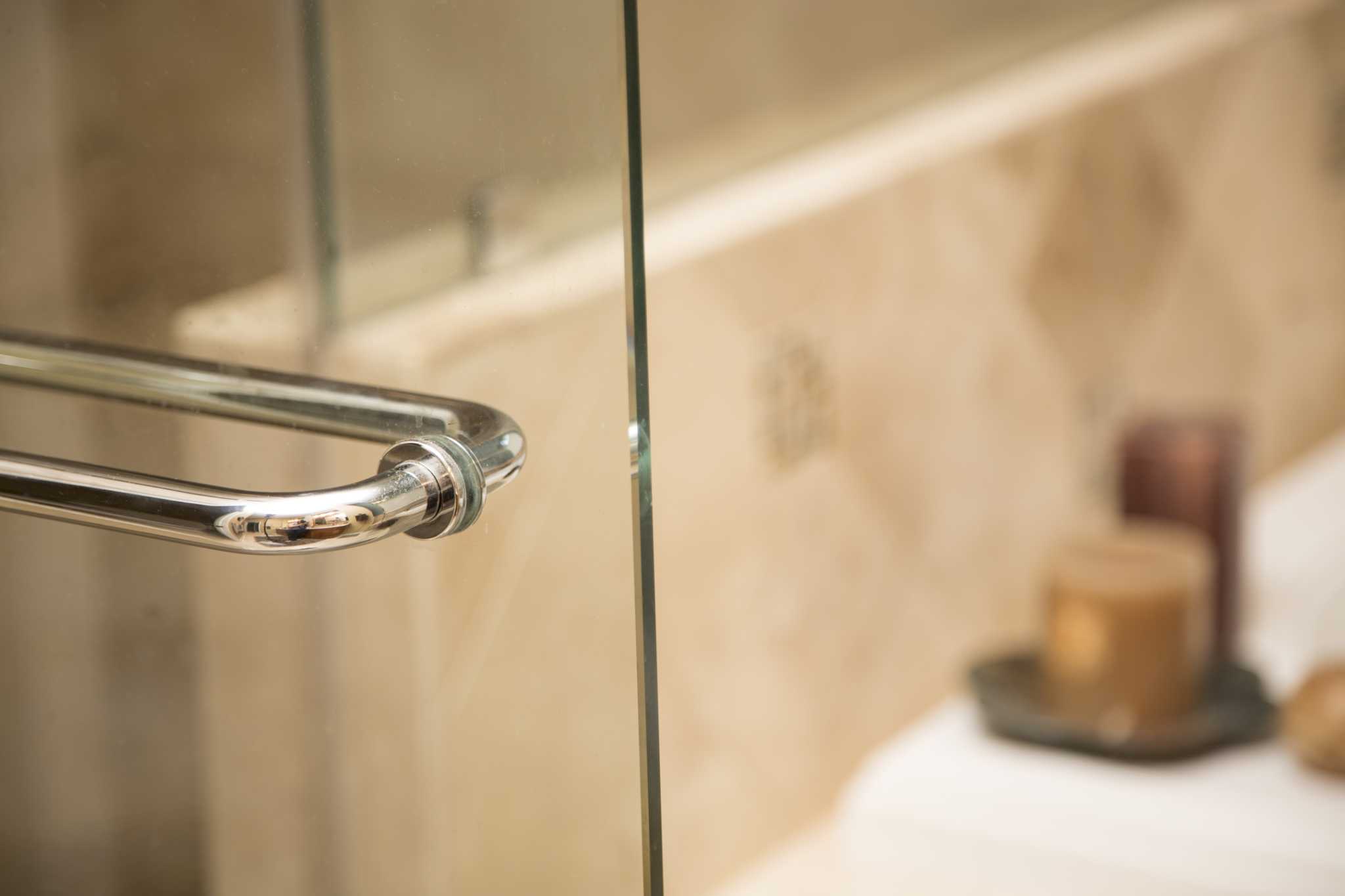 How to Adjust Frameless Glass Shower Door Hinges