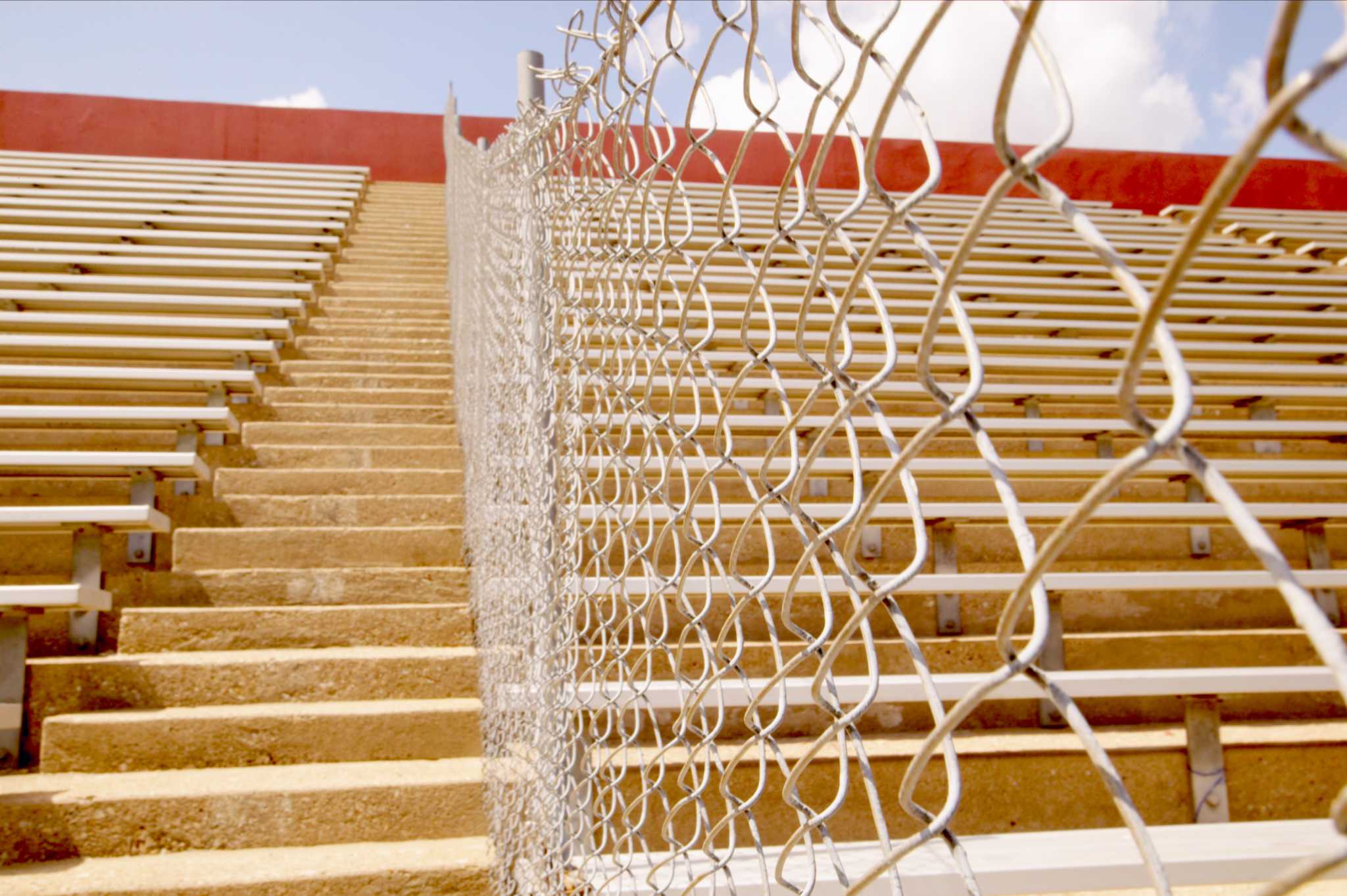 How to Affix a Temporary Fence to a Brick Wall