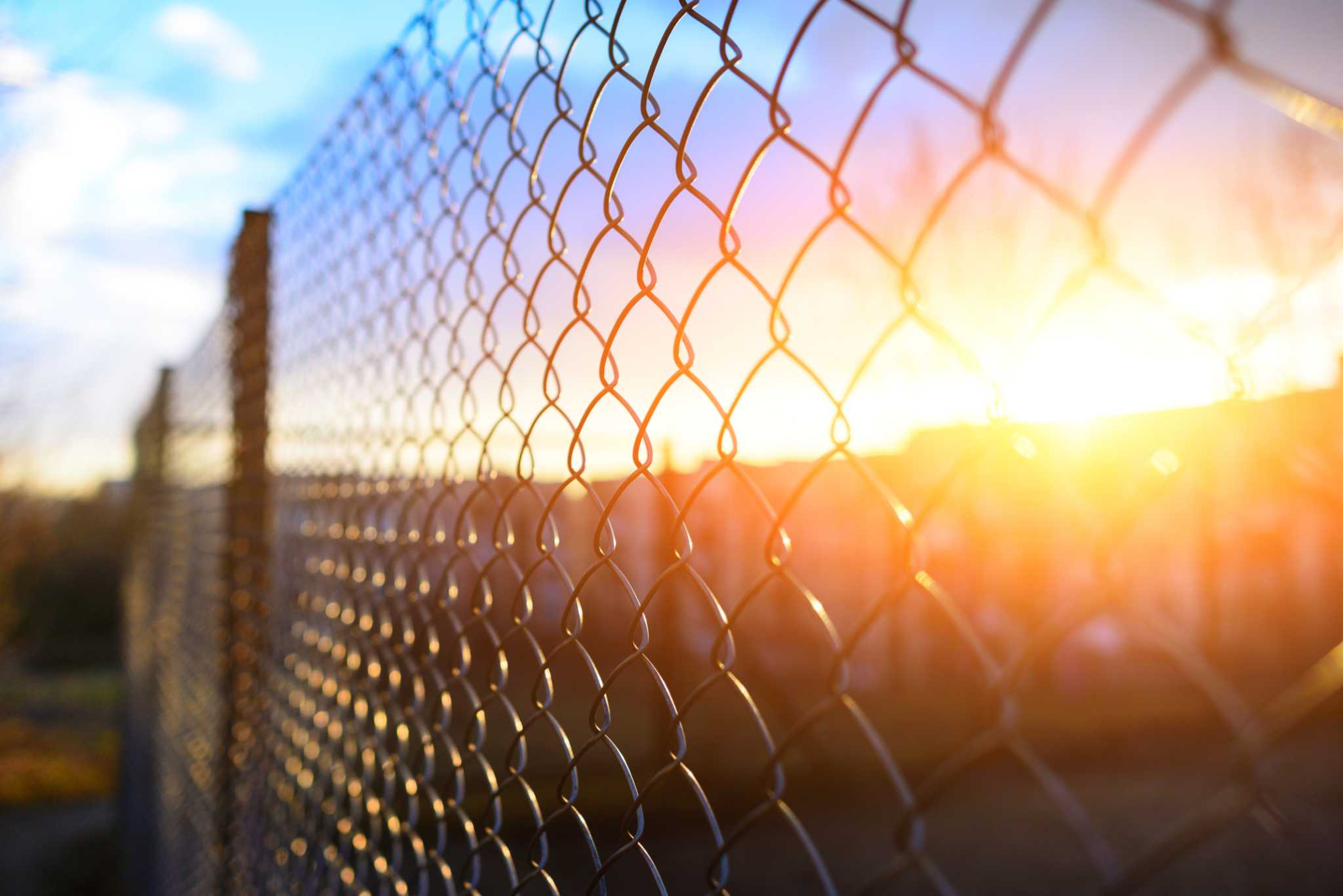 How to Extend the Height of a Chain-Link Fence