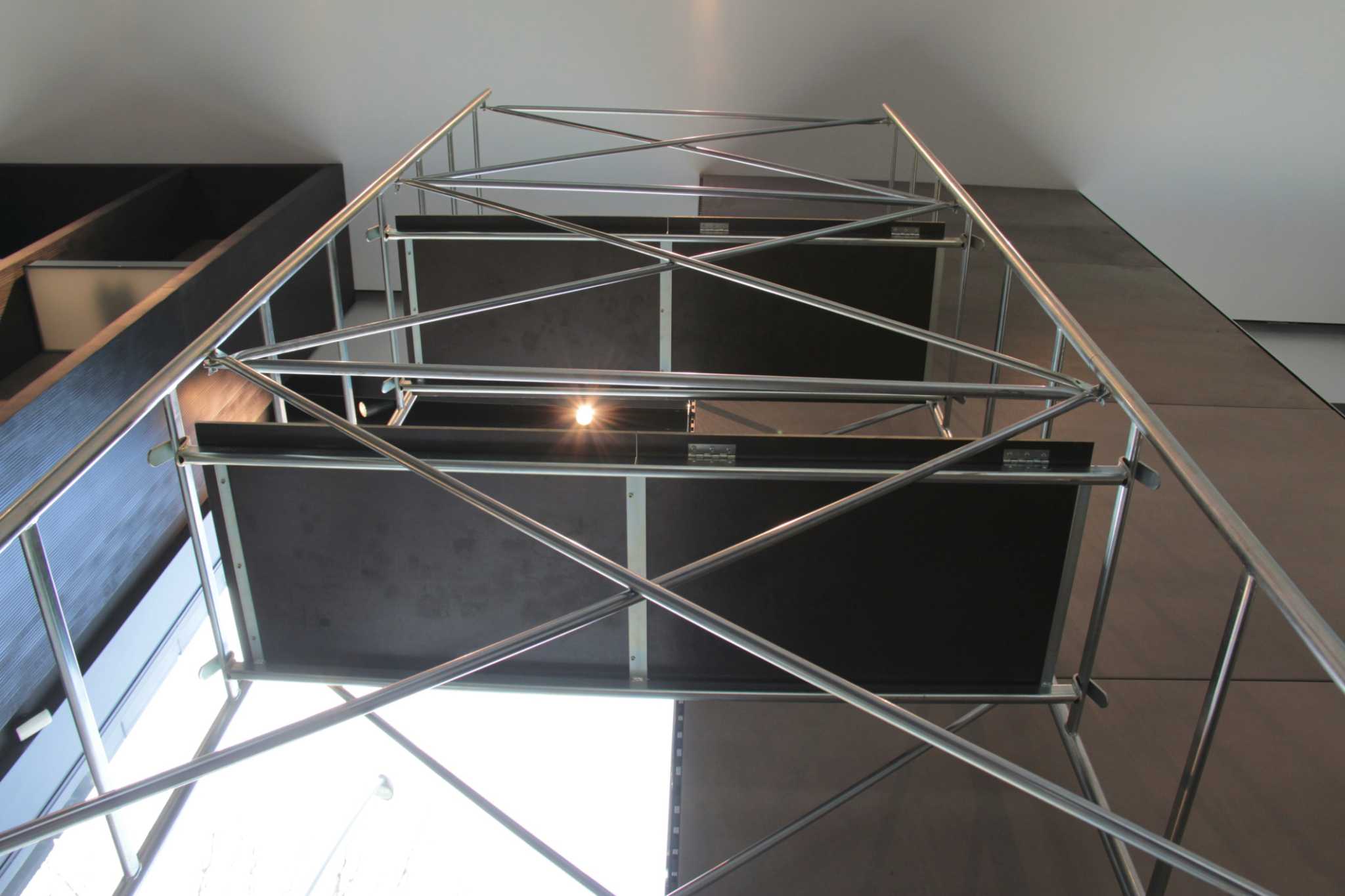 How Do Artists Reach Ceilings and High Walls to Paint Murals?