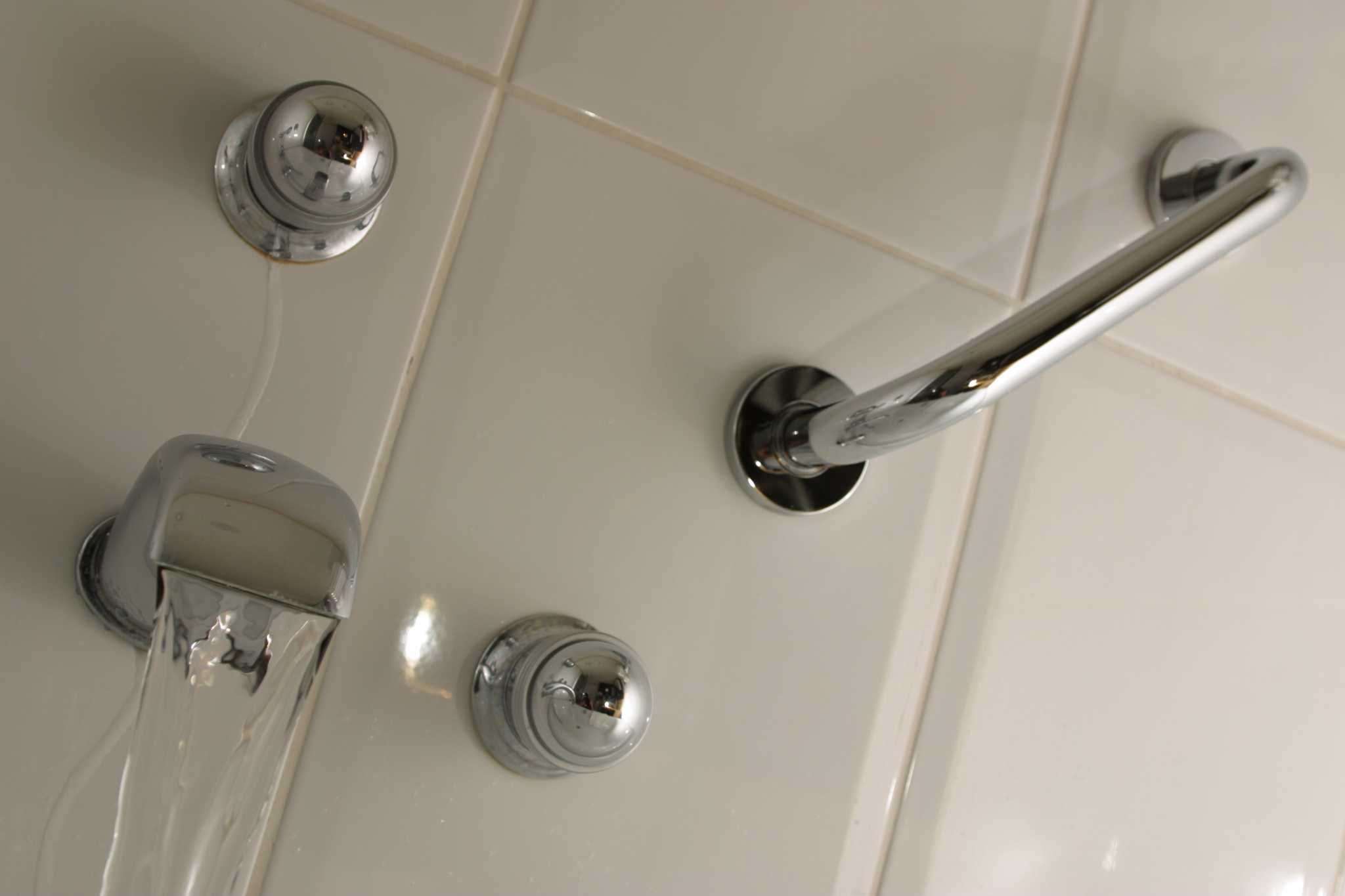 How to Attach a Handrail in the Shower