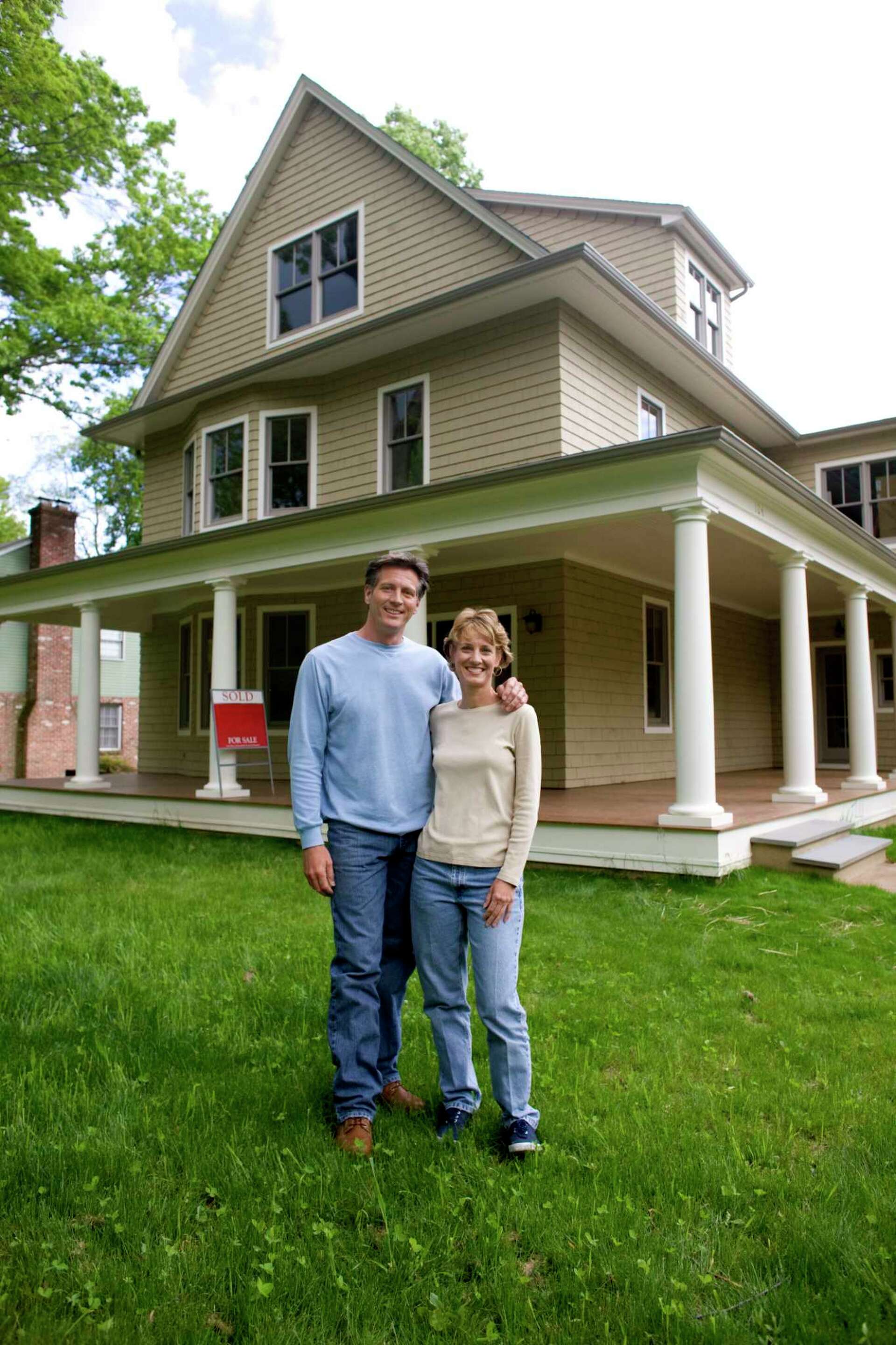 How to Attach a Ledger Board to a Vinyl Sided House