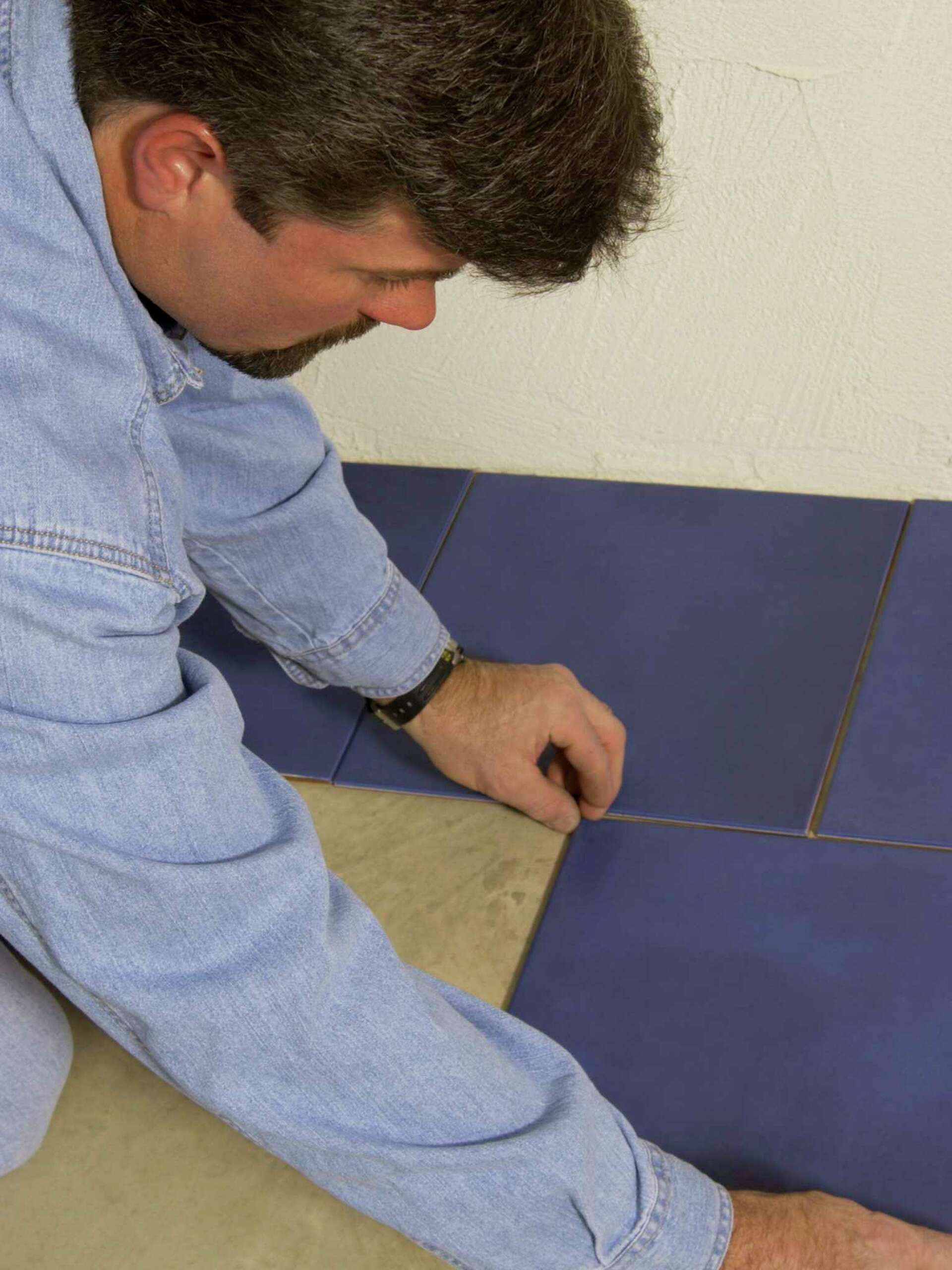How to Install Vinyl Floor Tile With Arrows on the Back of the Tile
