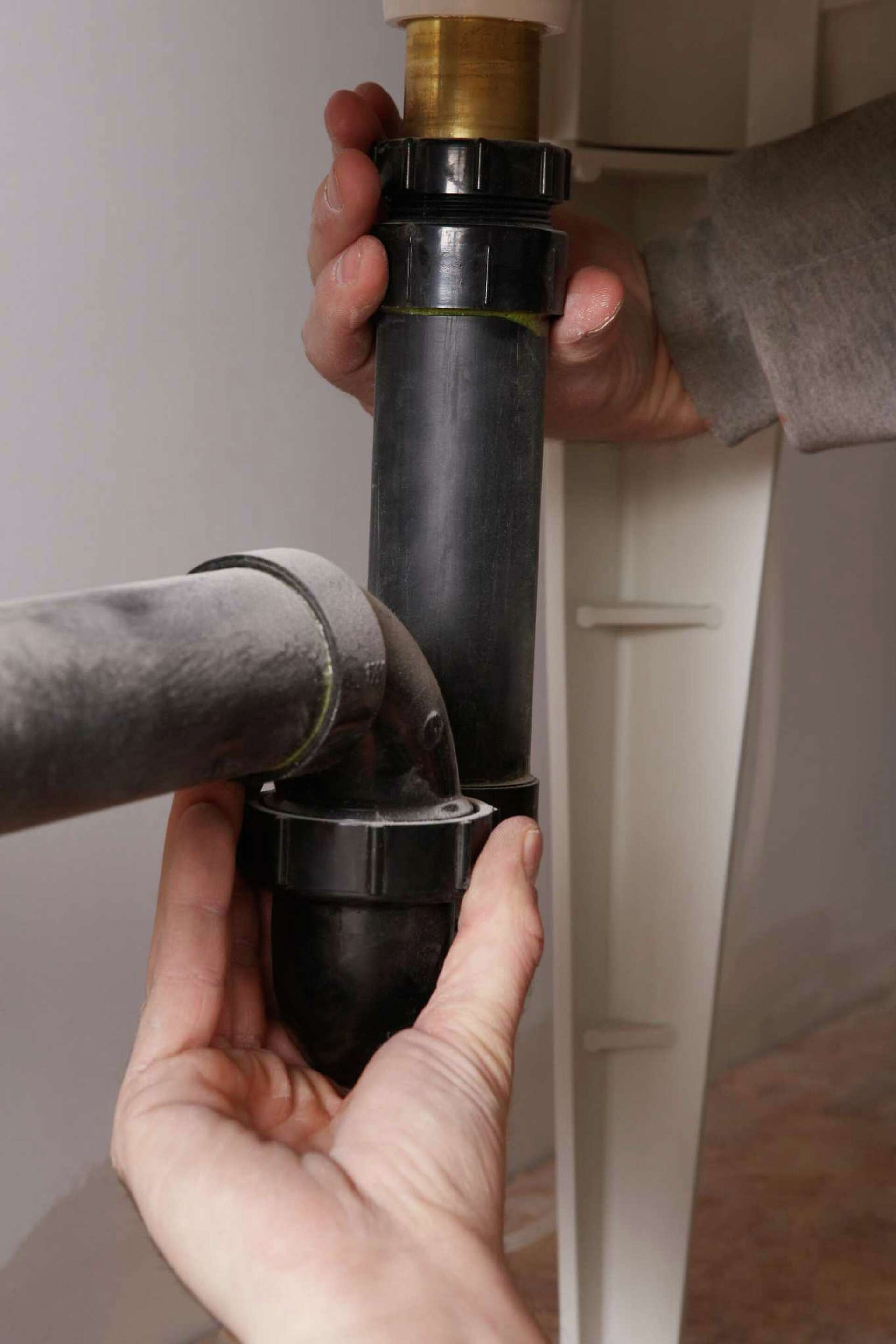 How to Remove the P-Trap Without a Plumbing Wrench