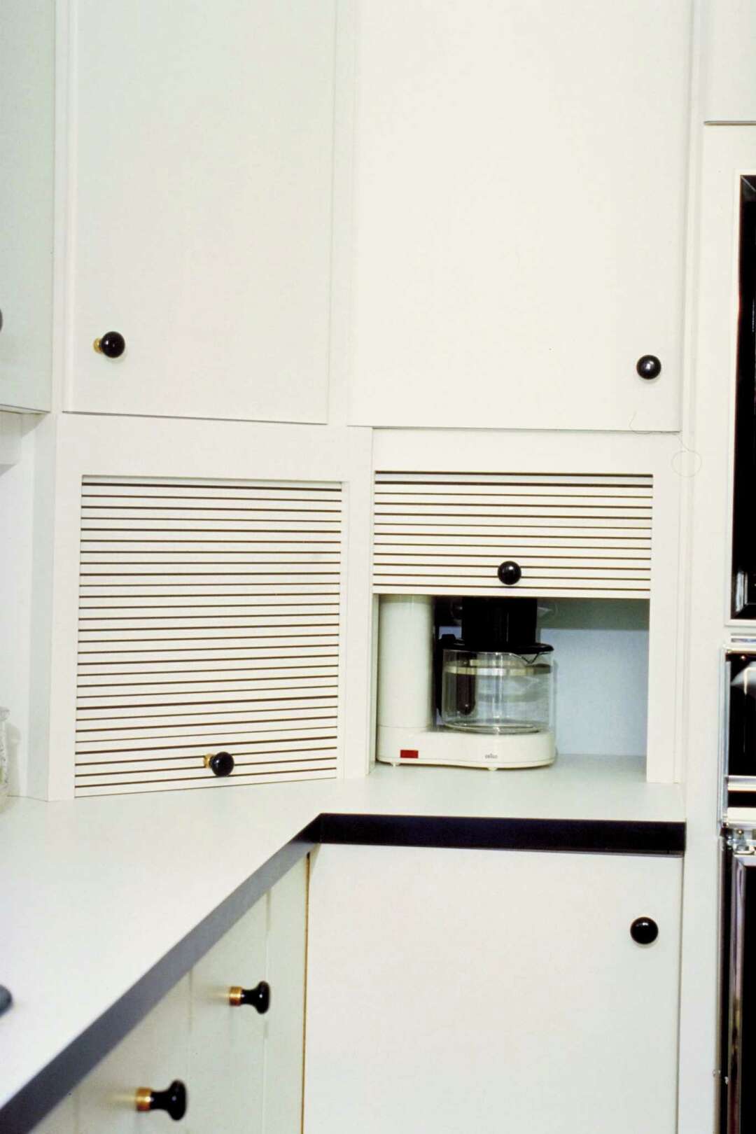 How to Fix a Sticking Revolving Corner Cupboard