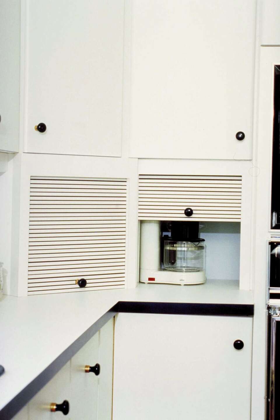 How to Fix a Sticking Revolving Corner Cupboard