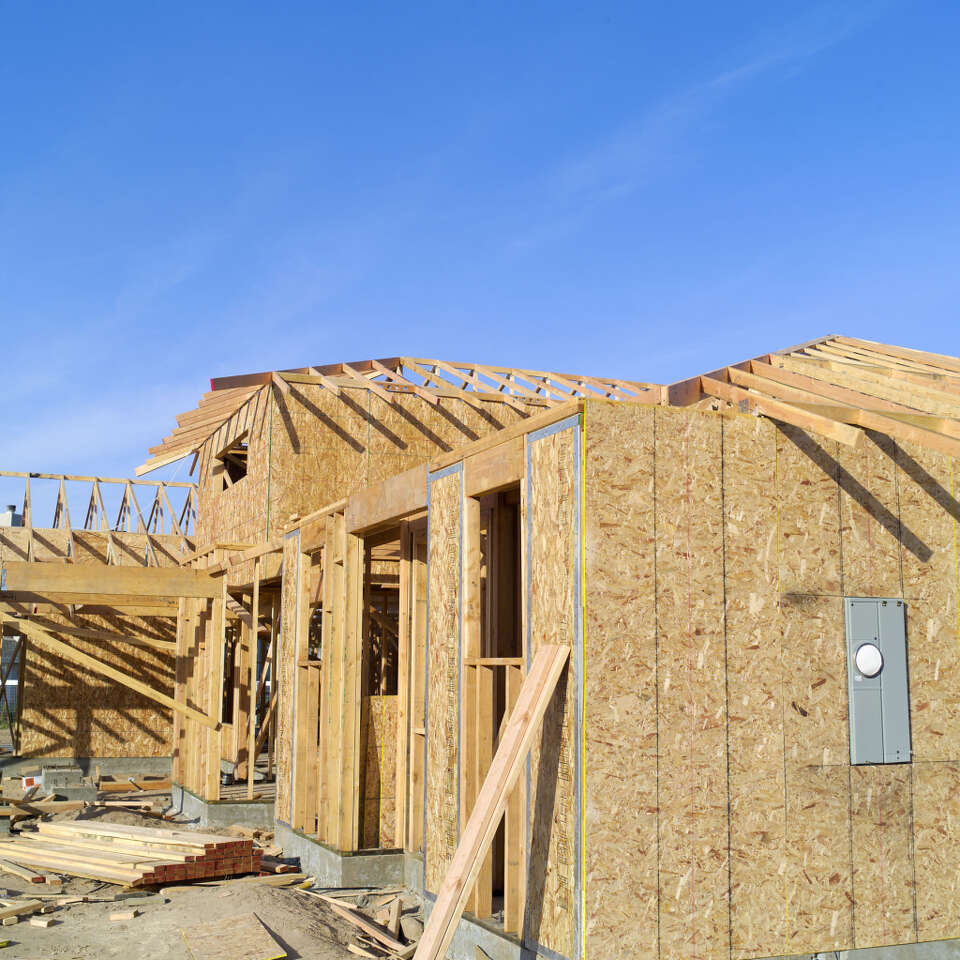 How to Frame a Load Bearing Beam on the Top of an Exterior Wall