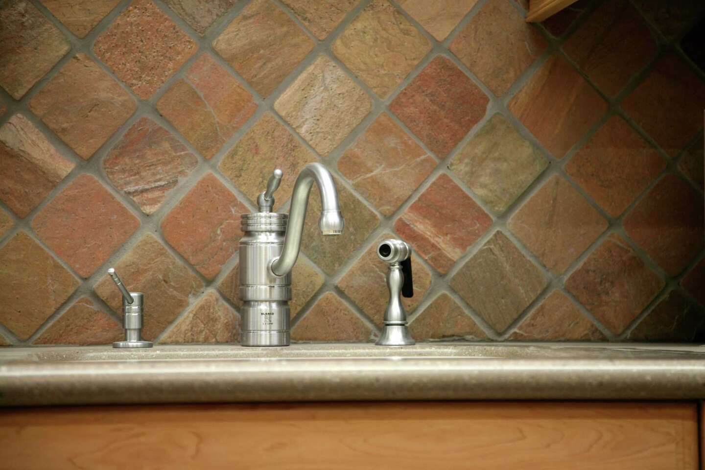 How to Replace a Leaky Sprayer on a Moen Kitchen Faucet