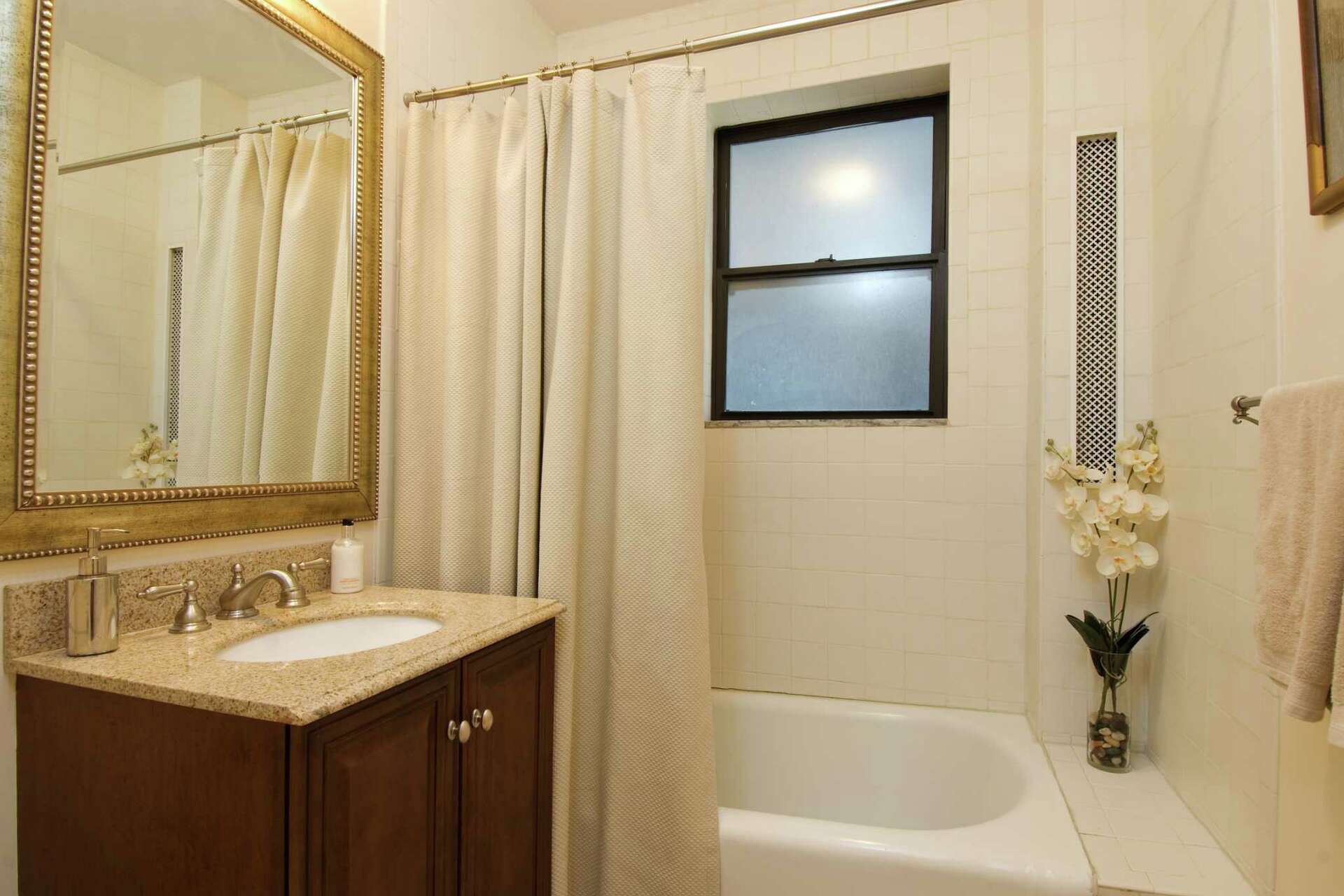 How to Install a Bath Vanity Against a Baseboard