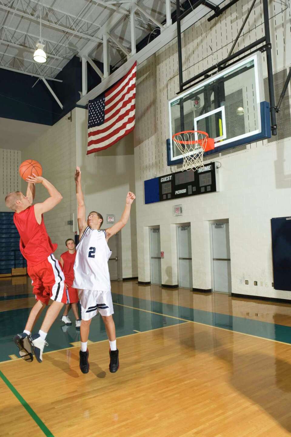 How to Hang a Basketball Backboard From a Concrete Block Wall