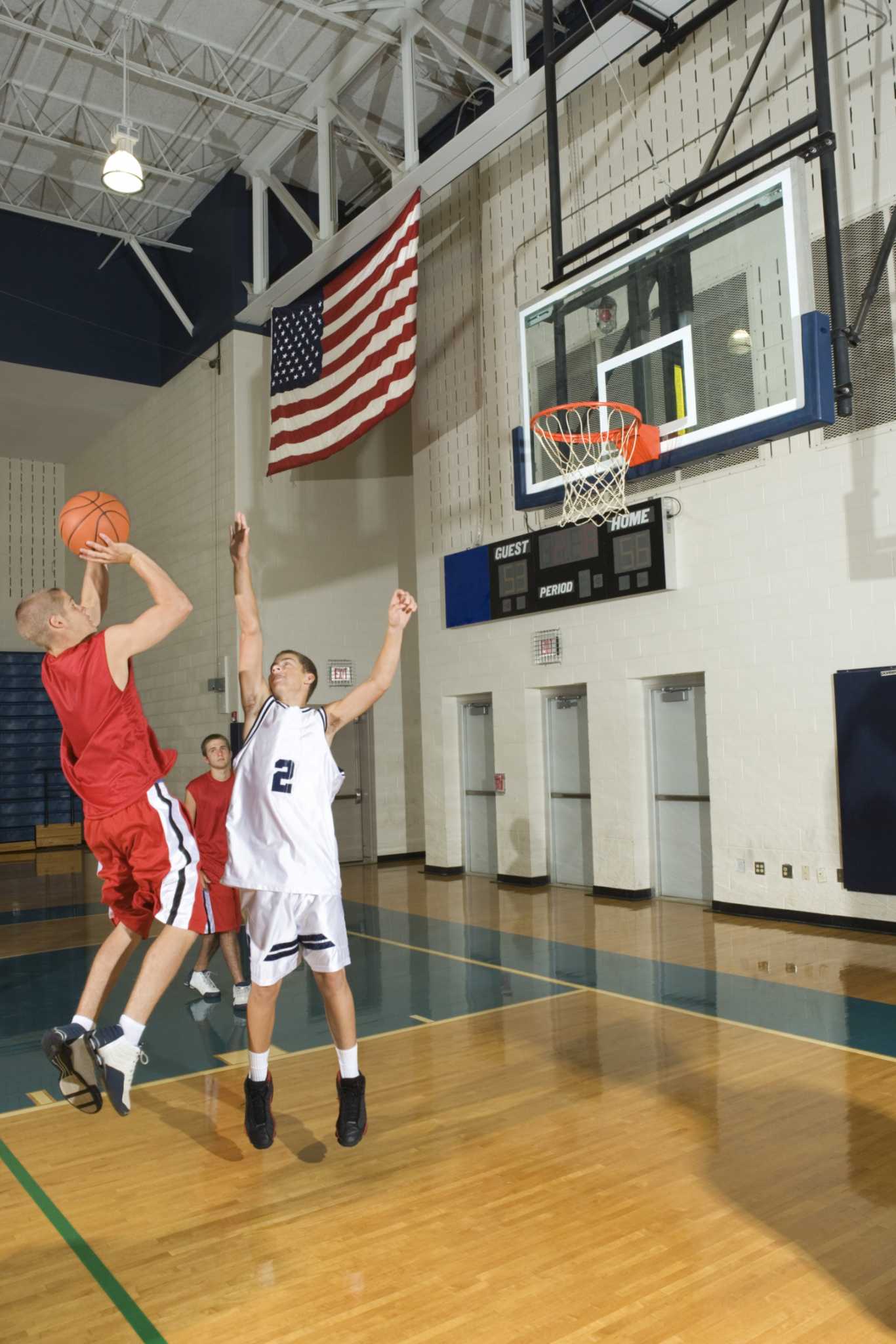 How to Hang a Basketball Backboard From a Concrete Block Wall