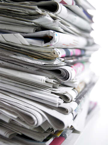 How to Hang Newspaper on Walls